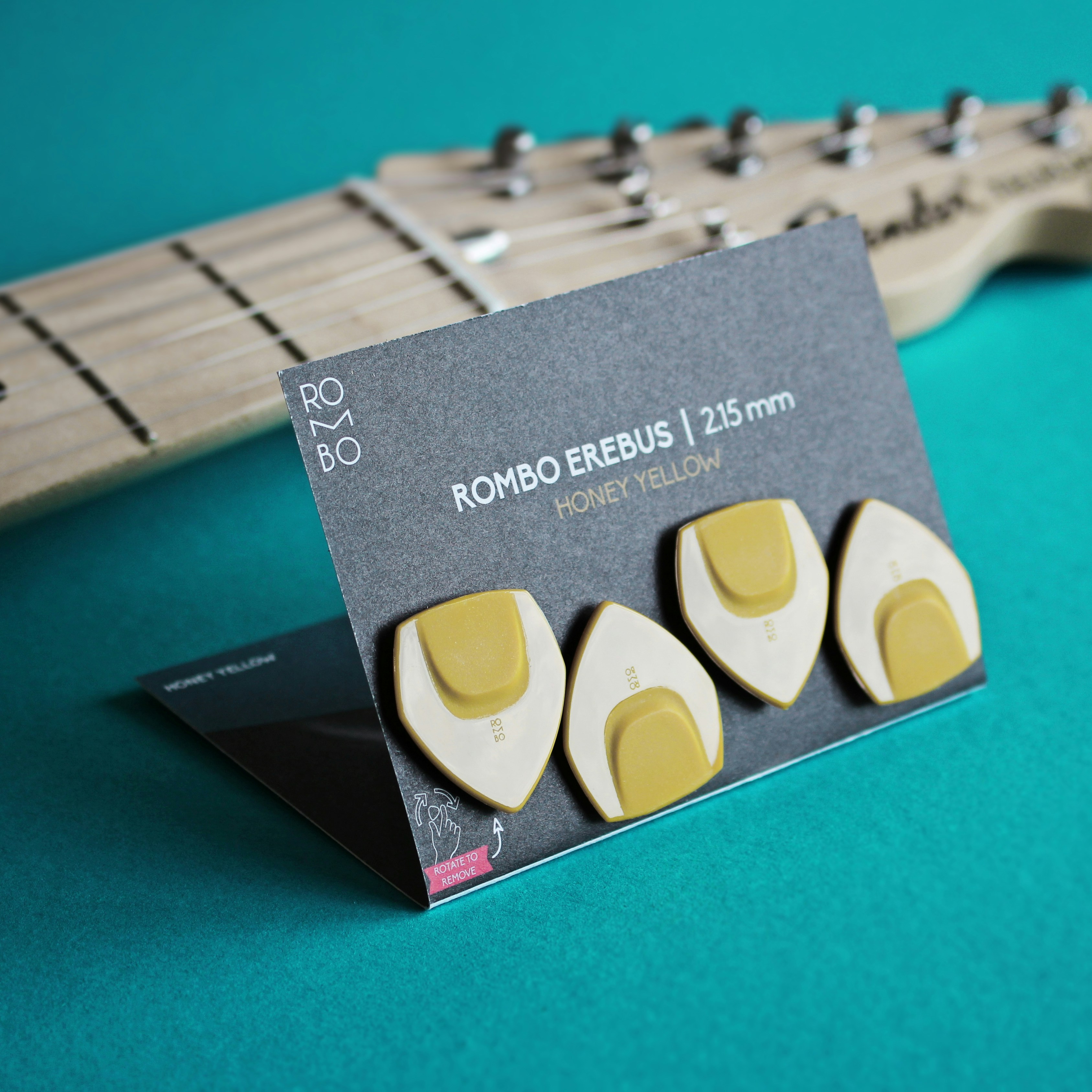 A set of three yellow and white guitar picks photo – Free Electric ...