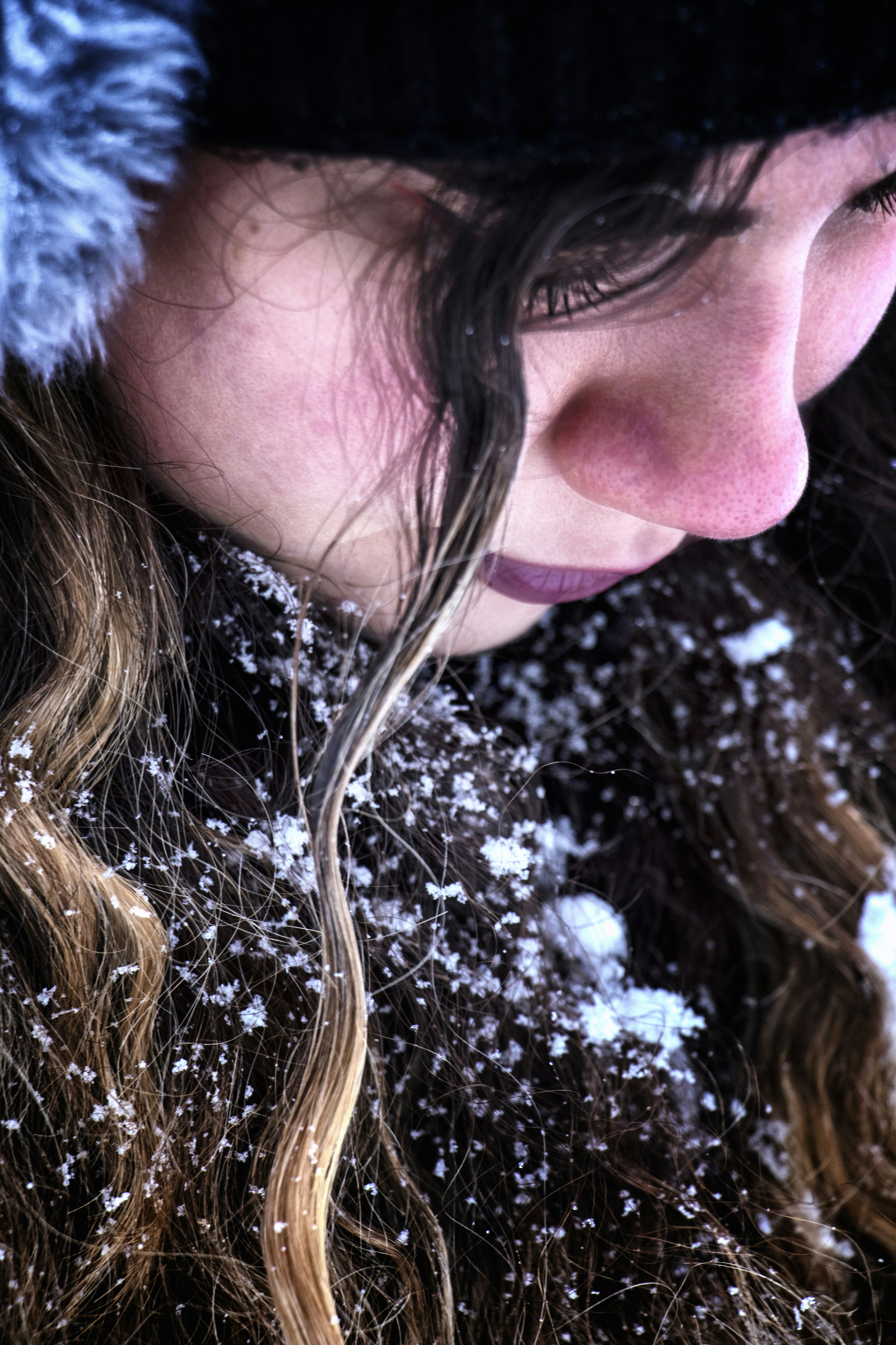 Snow-Kissed Profile: A Winter Close-Up Portrait