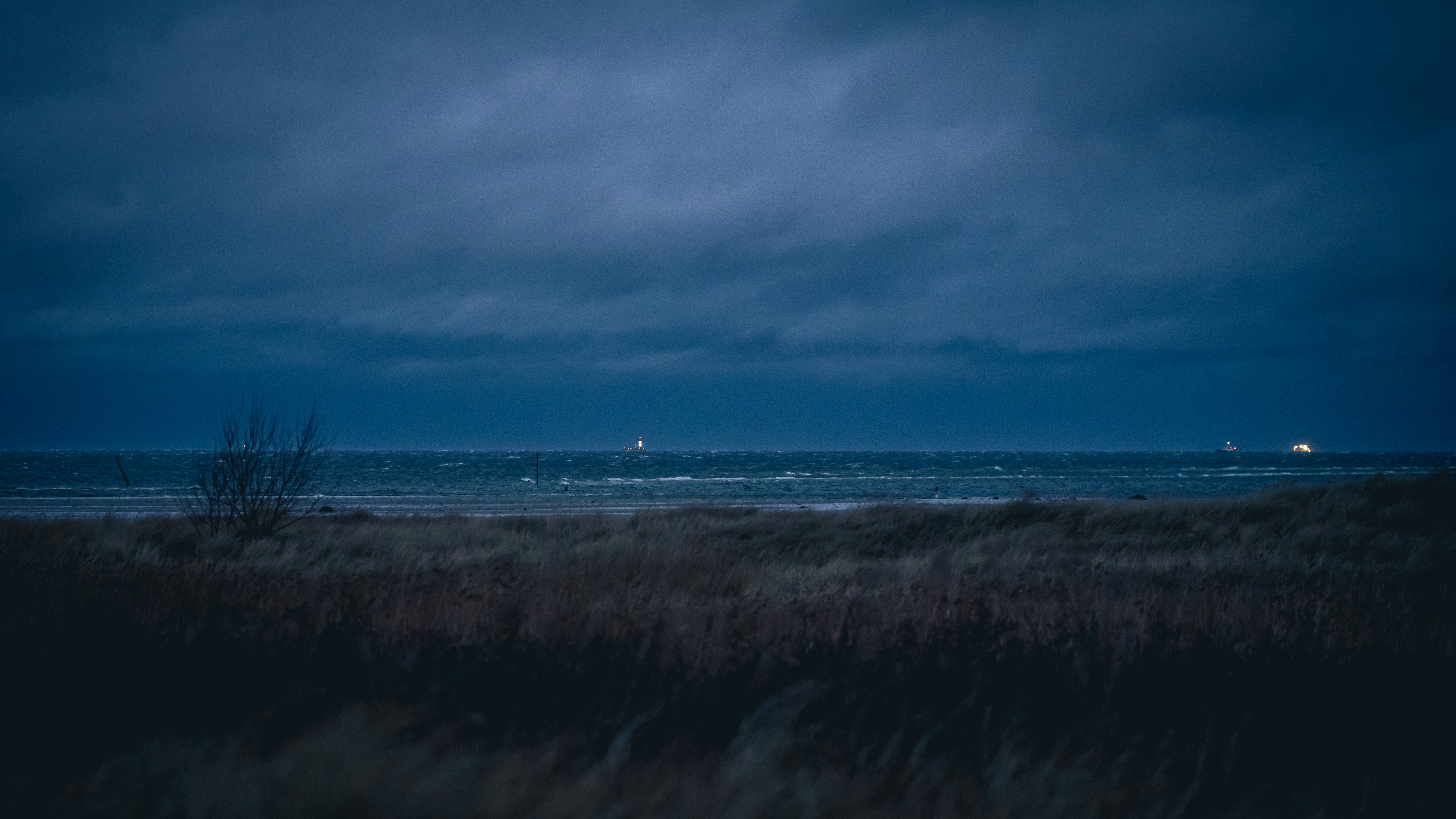 a view of a body of water at night
