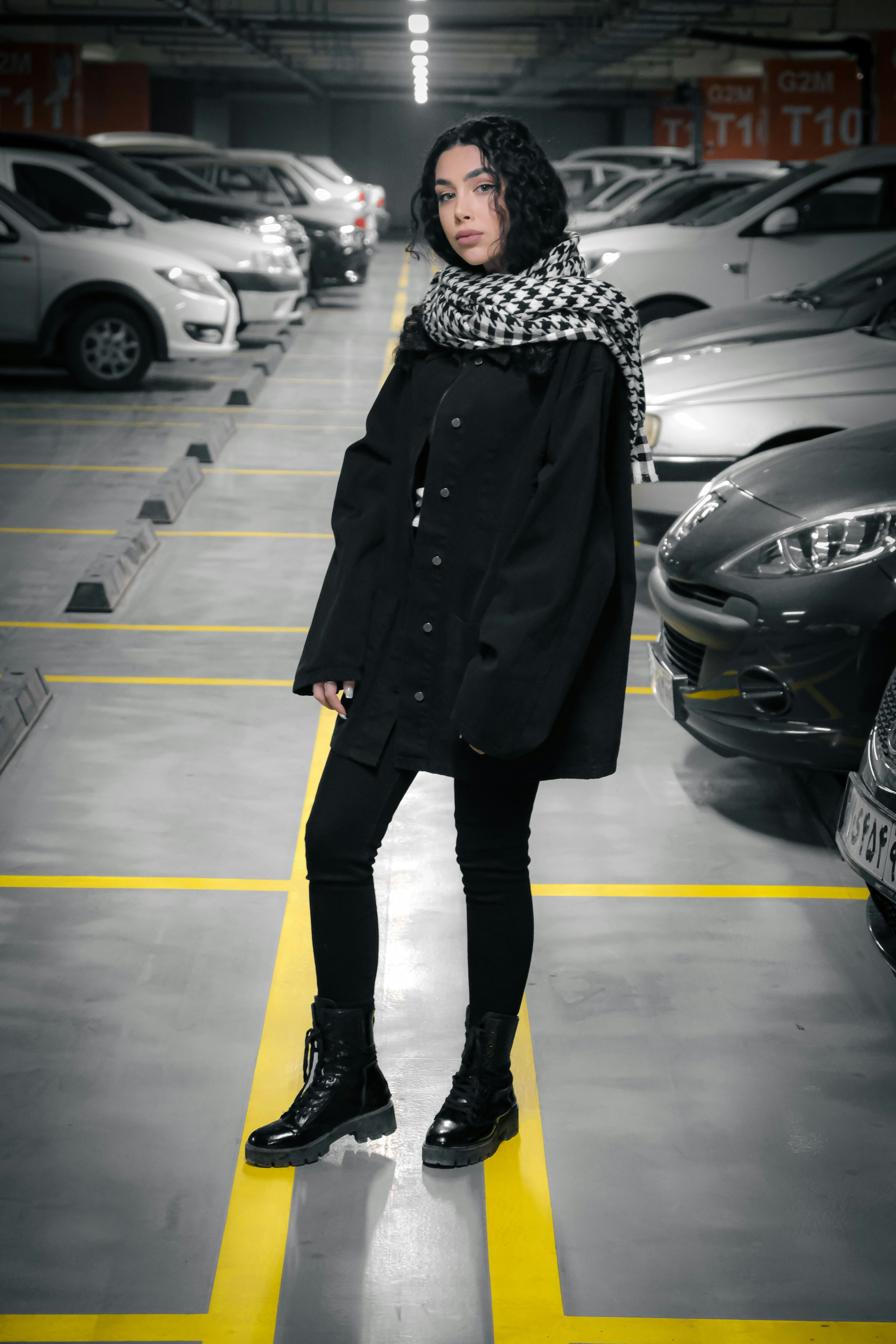 Midnight in the Parking Lot: A Quiet Poise Beneath Neon Lines
