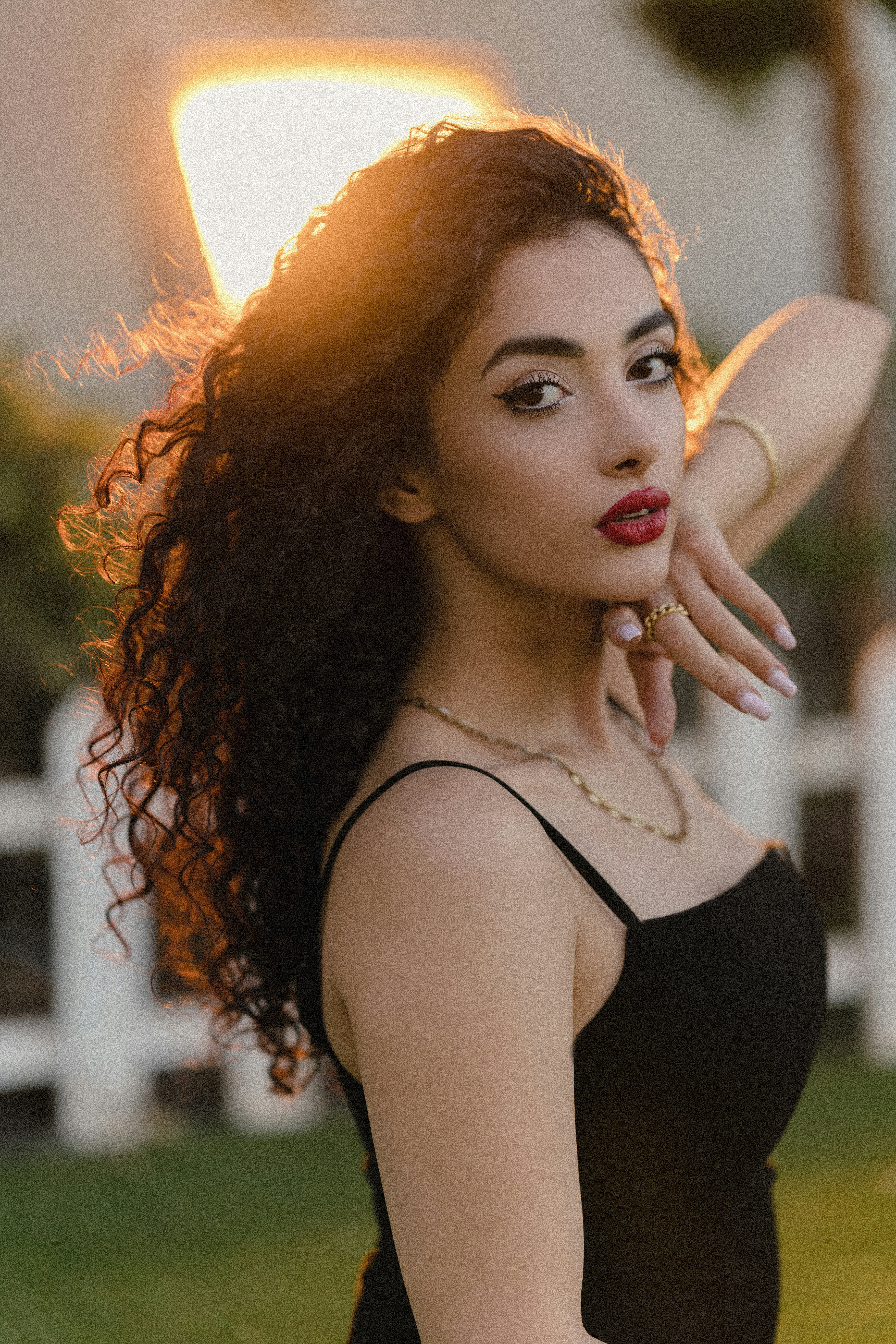 A woman in a black dress posing for a picture photo – Free Iran Image on Unsplash