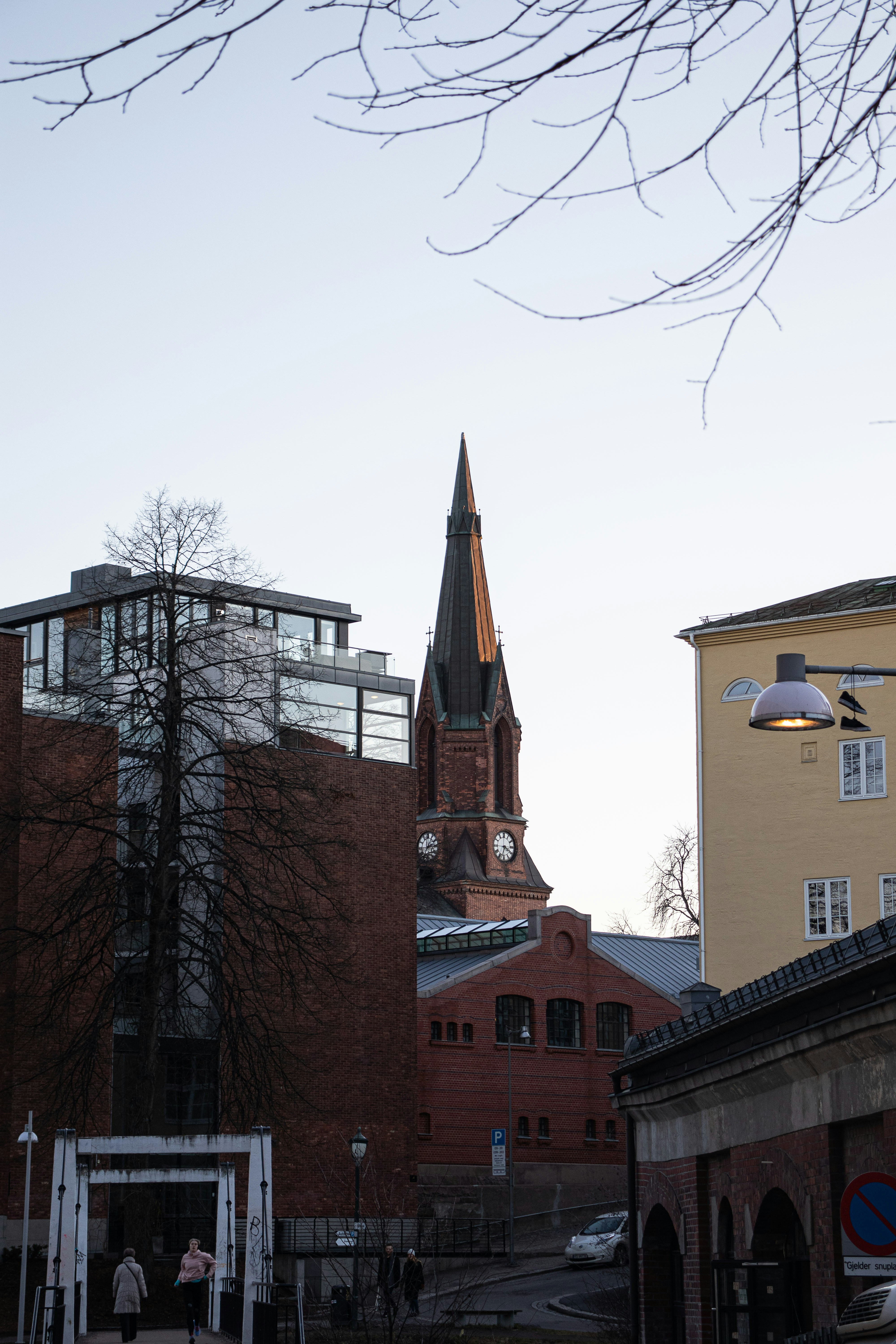 Steeple Between Facades: A Quiet City Moment