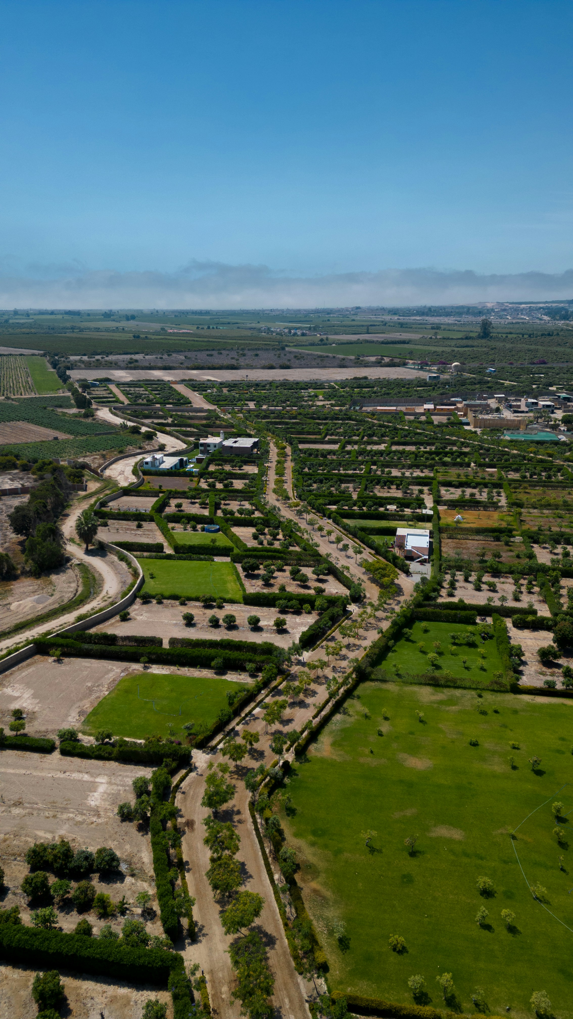 An aerial view of a rural area with lots of trees photo – Free Building ...