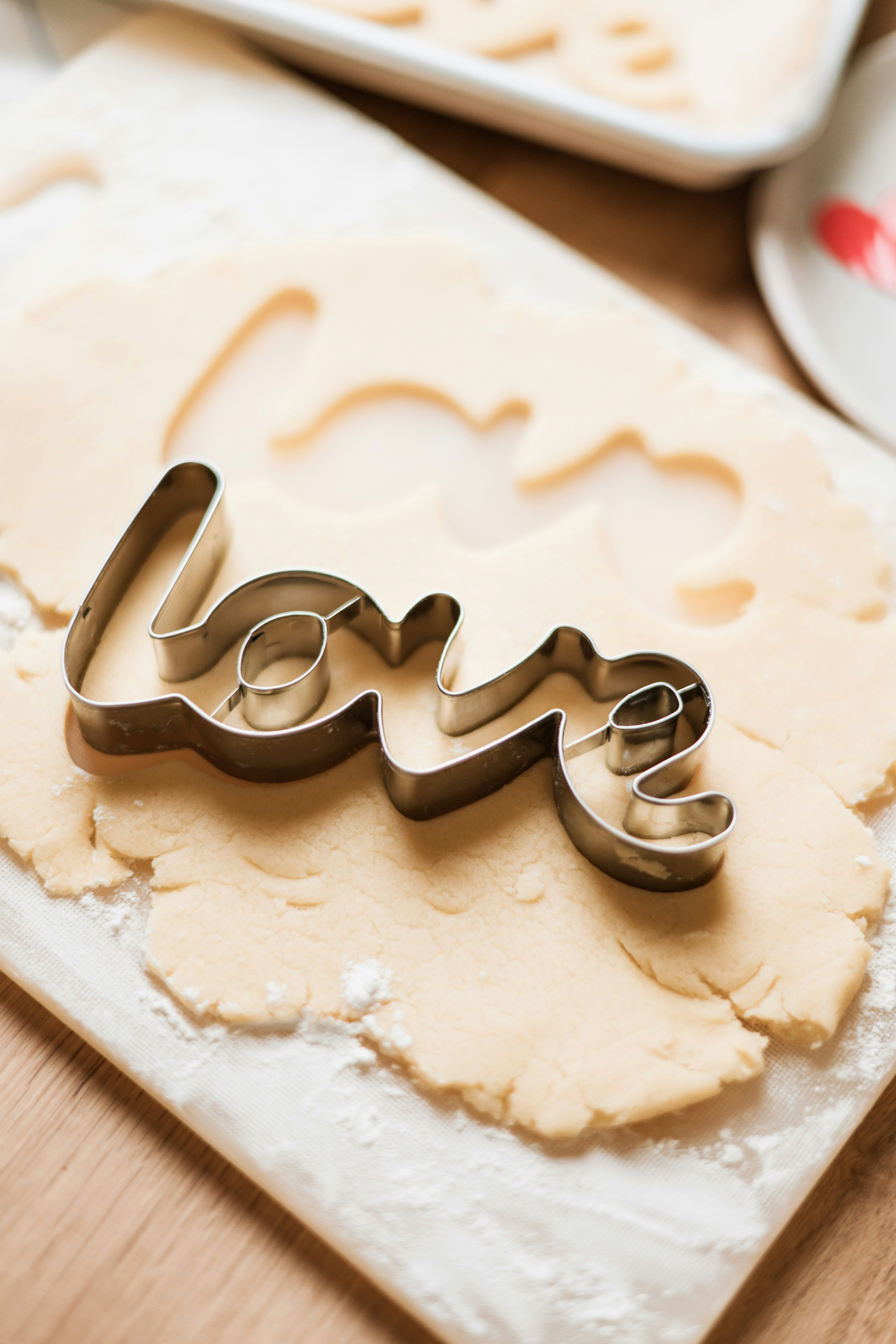 A cookie cutter sitting on top of a cookie photo – Free Food Image on ...