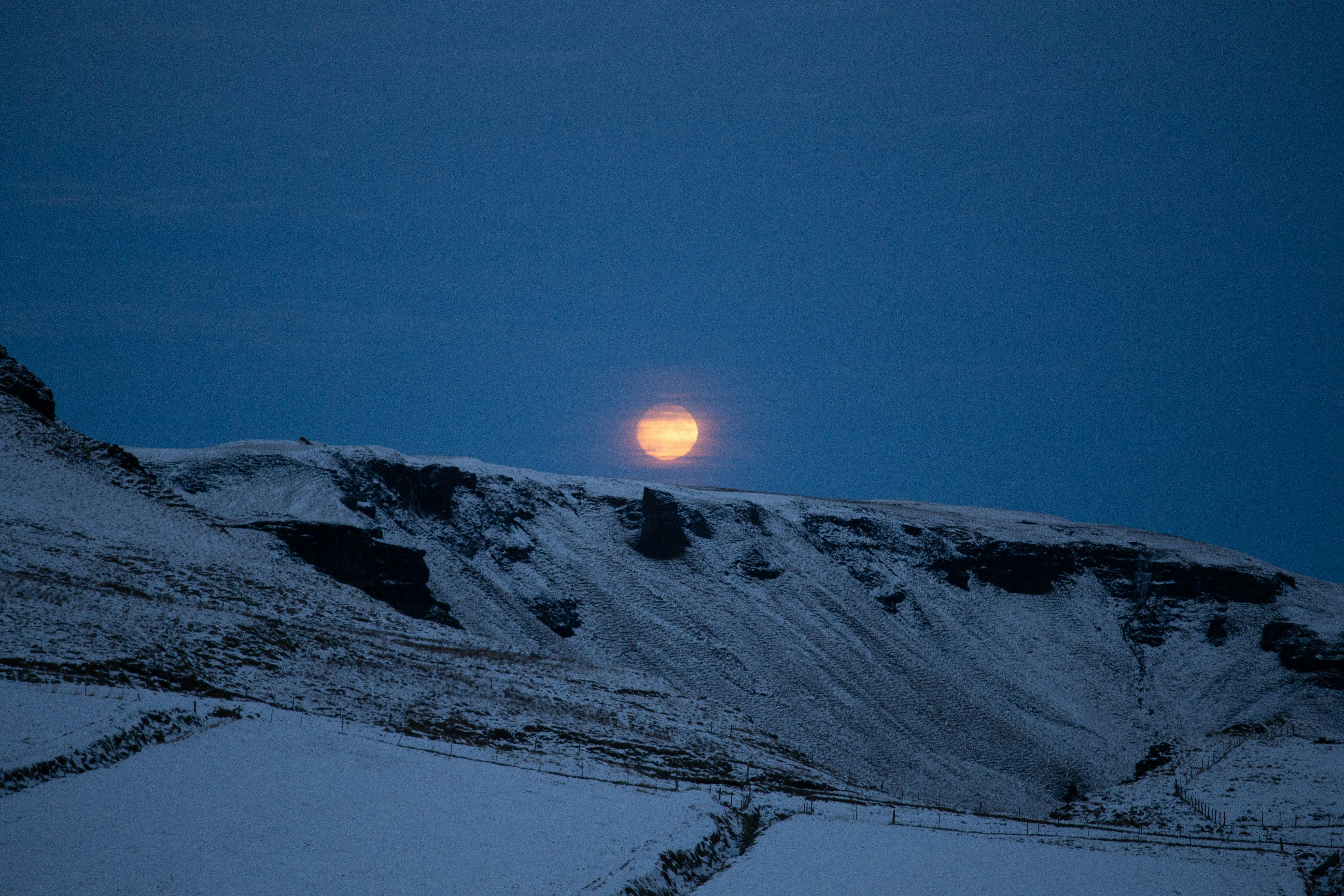 A full moon rising over a snowy mountain photo – Free Iceland Image on ...