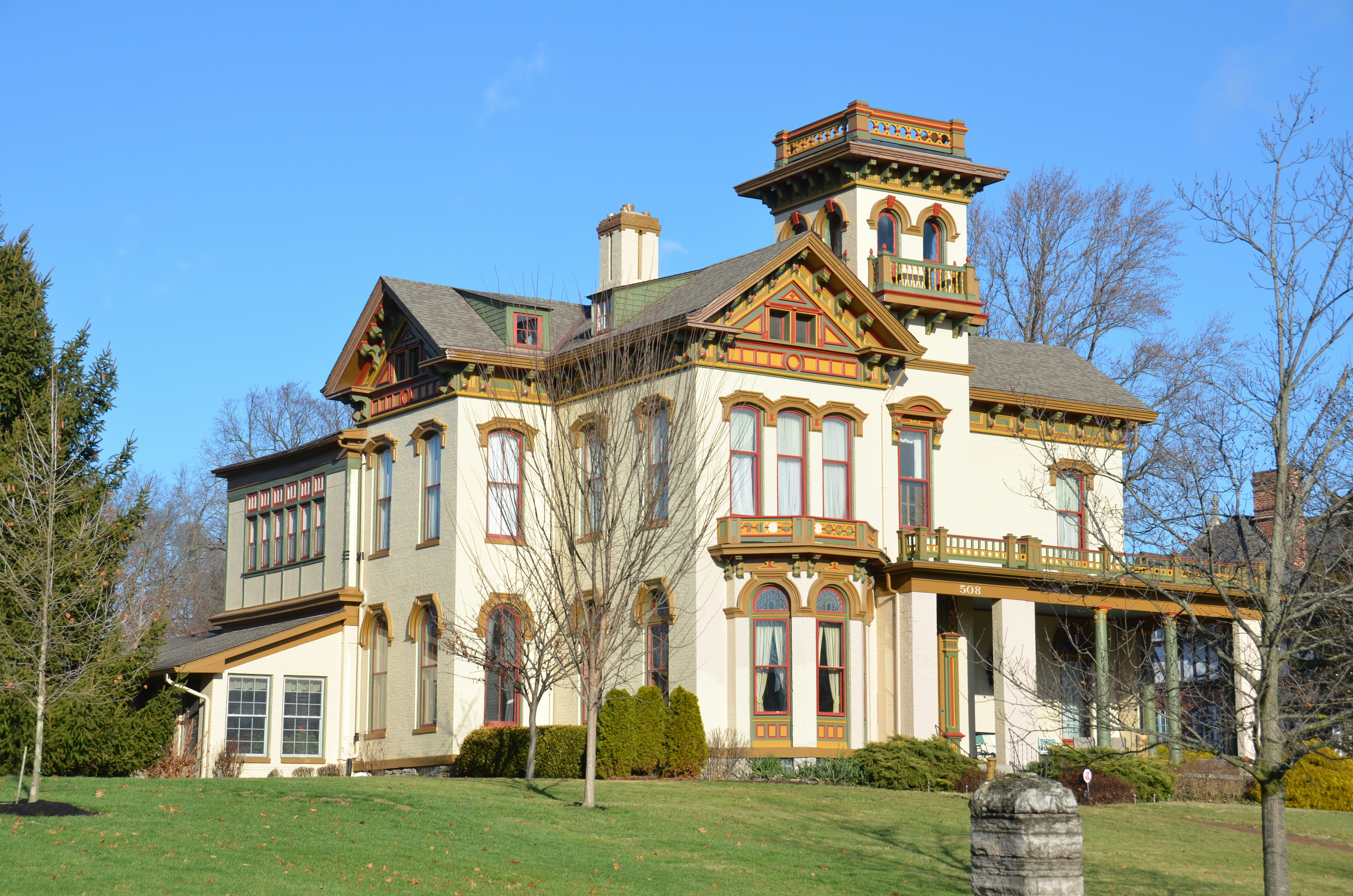 A large house with a tall tower on top of it photo – Free Housing Image ...