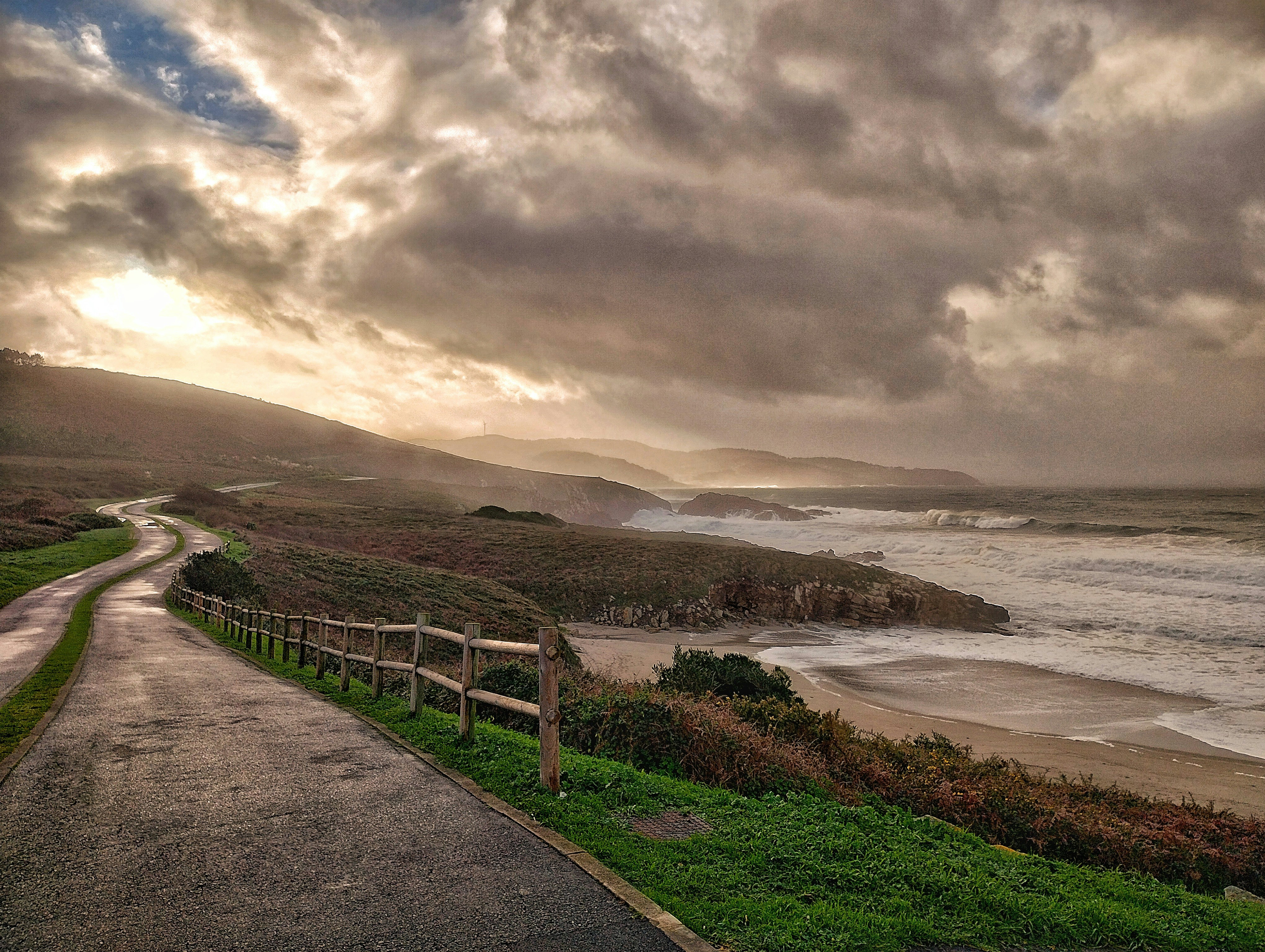 Dawn on the Coastal Path: A Wind-Swept Walk Toward the Sea