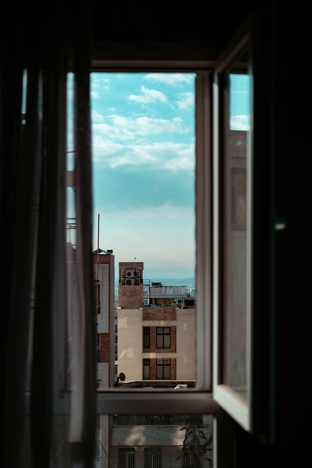 Une vue d’une ville depuis une fenêtre photo – Photo gratuite sur Unsplash Une vue d’une ville depuis une fenêtre photo – Photo gratuite sur Unsplash