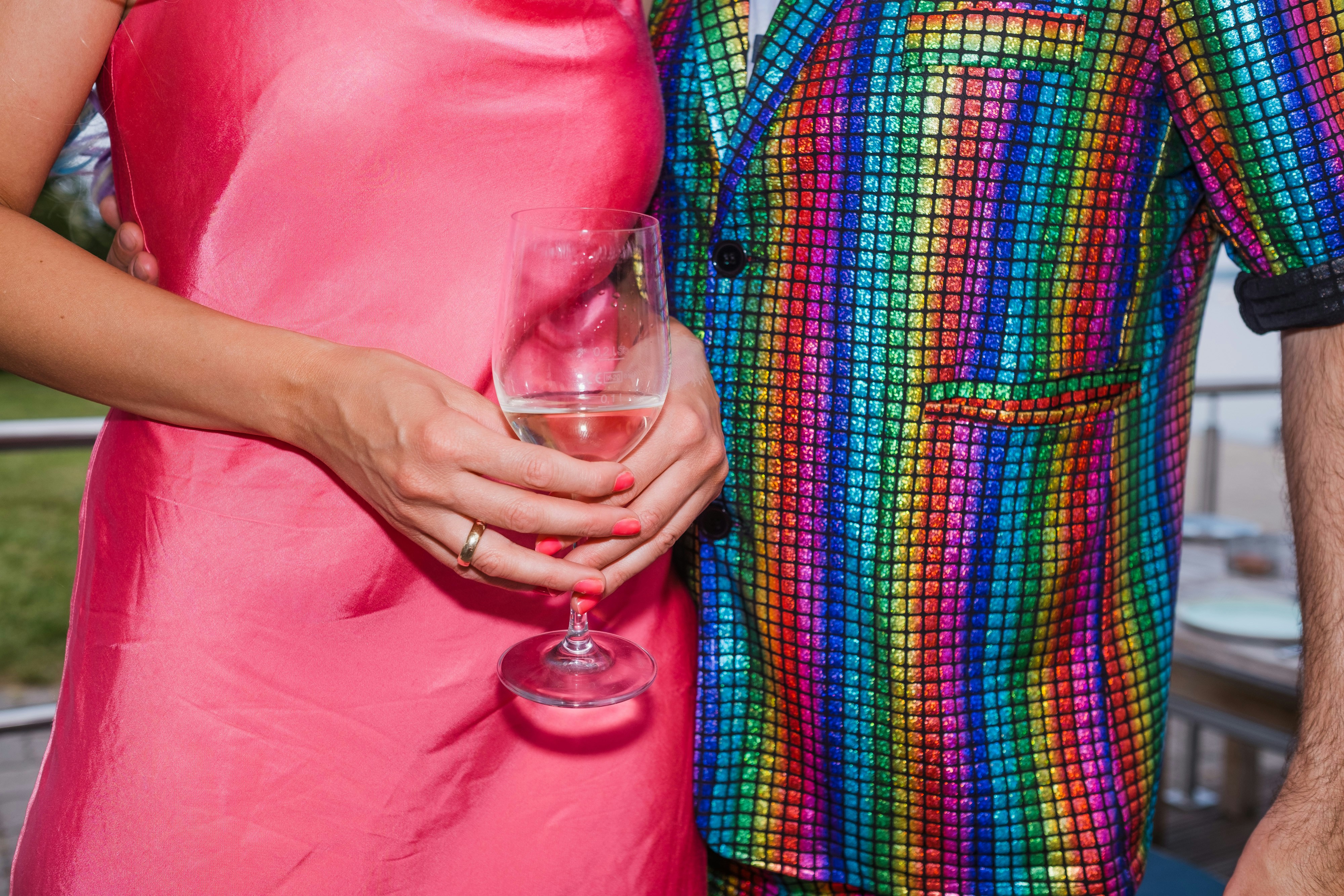 Pink Satin Glow Beside a Rainbow Sequin: A Festive Toast