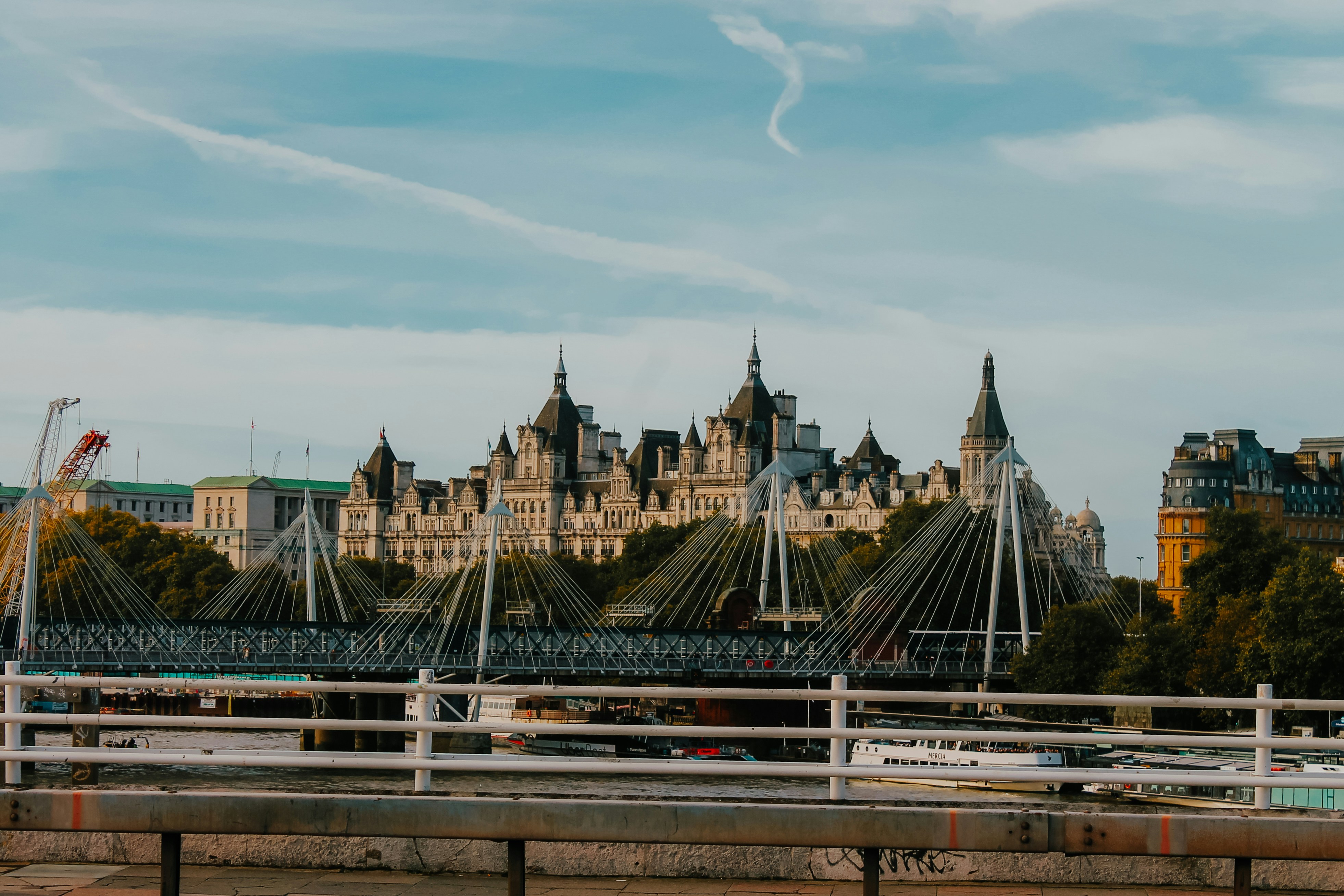 A view of a large building from across the river photo – Free Bridge ...