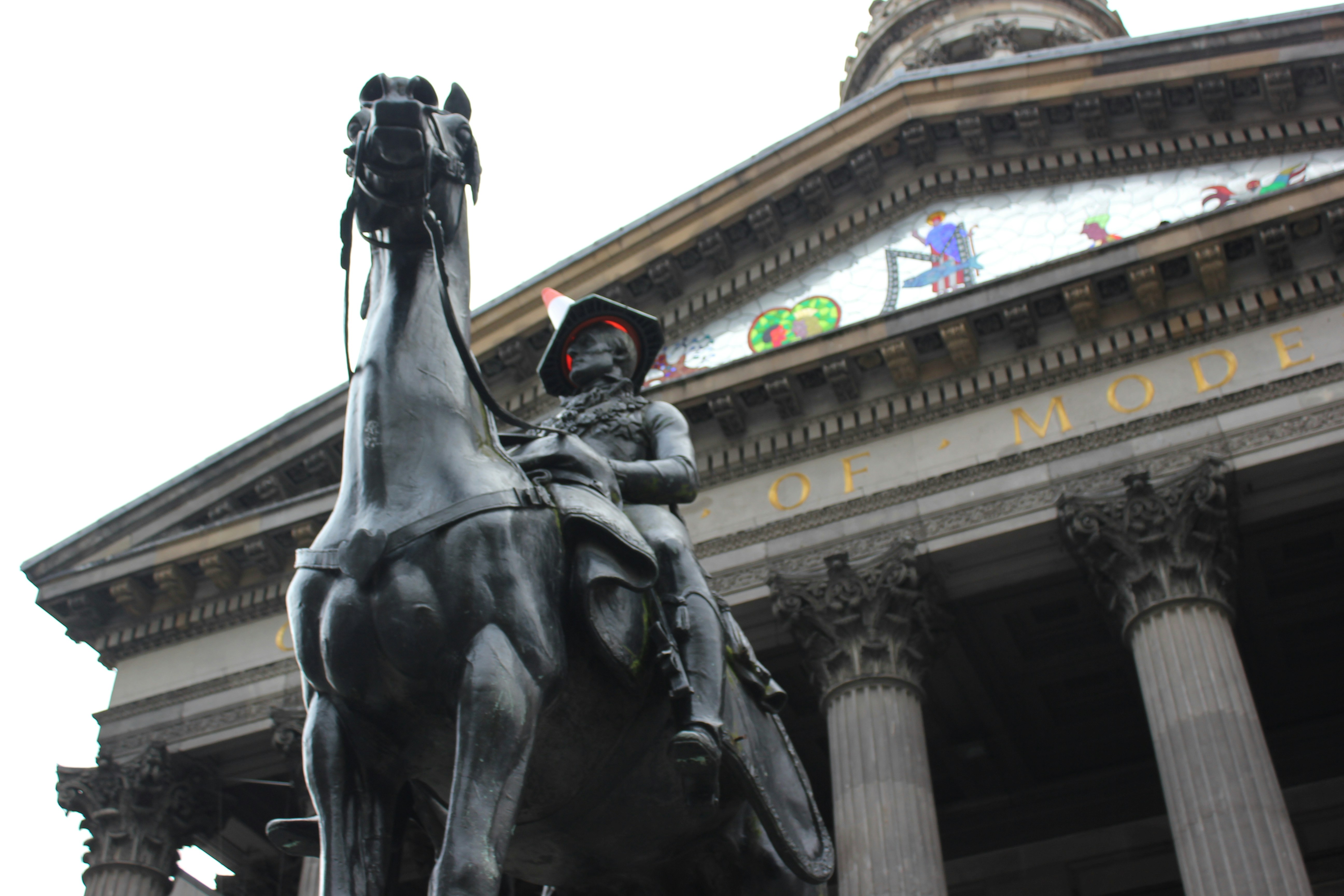 Equestrian Sentinel Before a Classical Facade