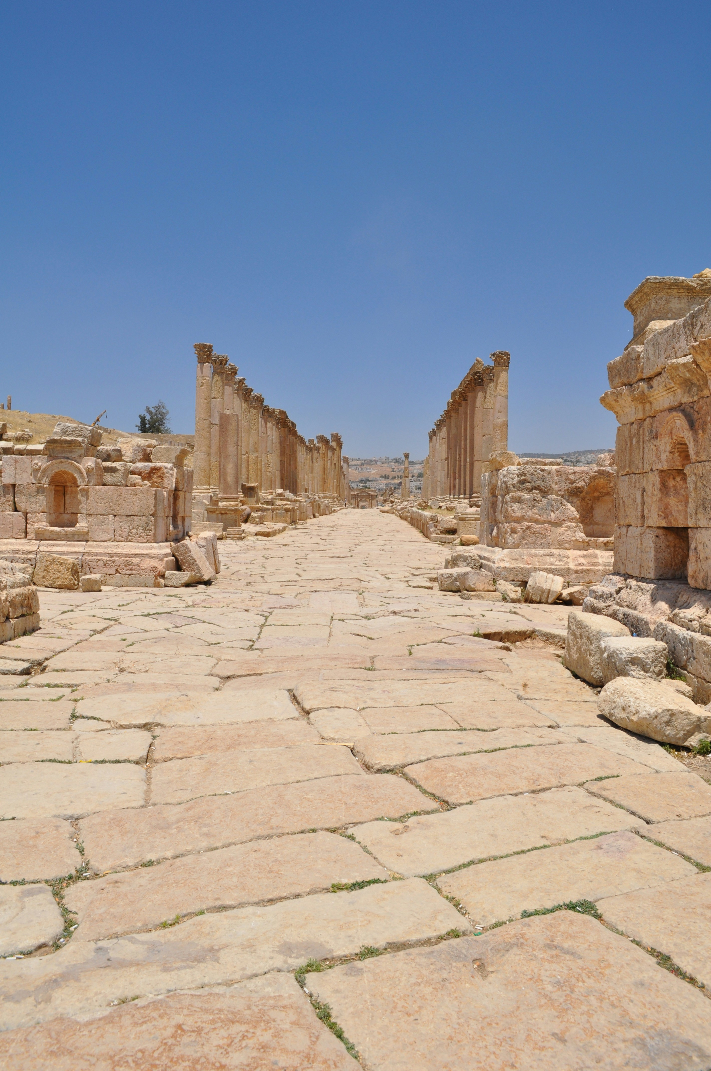 A stone walkway in the middle of an ancient city photo – Free Israel ...