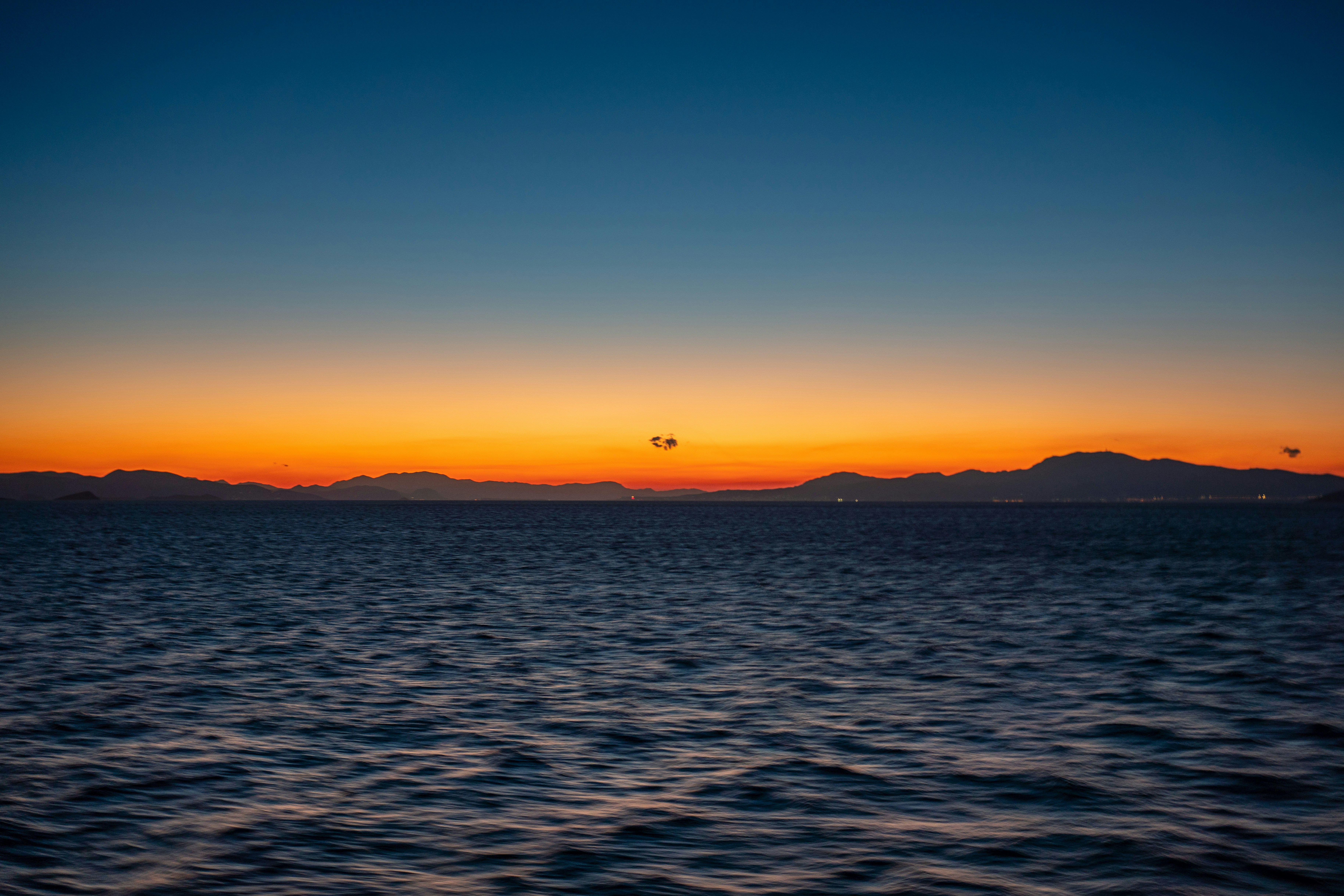 Horizon Fire: Twilight on a Quiet Sea