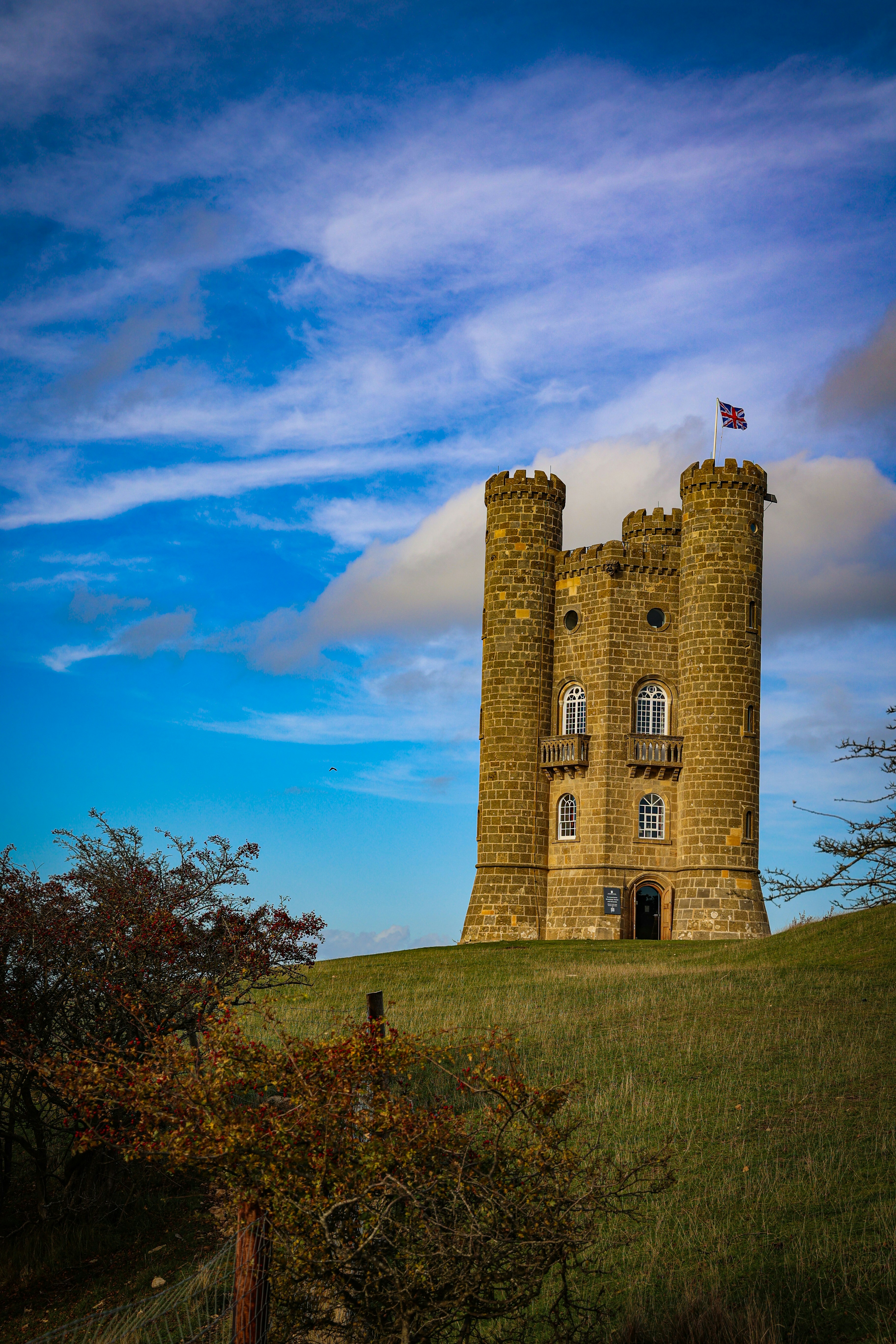 Castle on the Crest: A Stone Sentinel Under Wide Skies