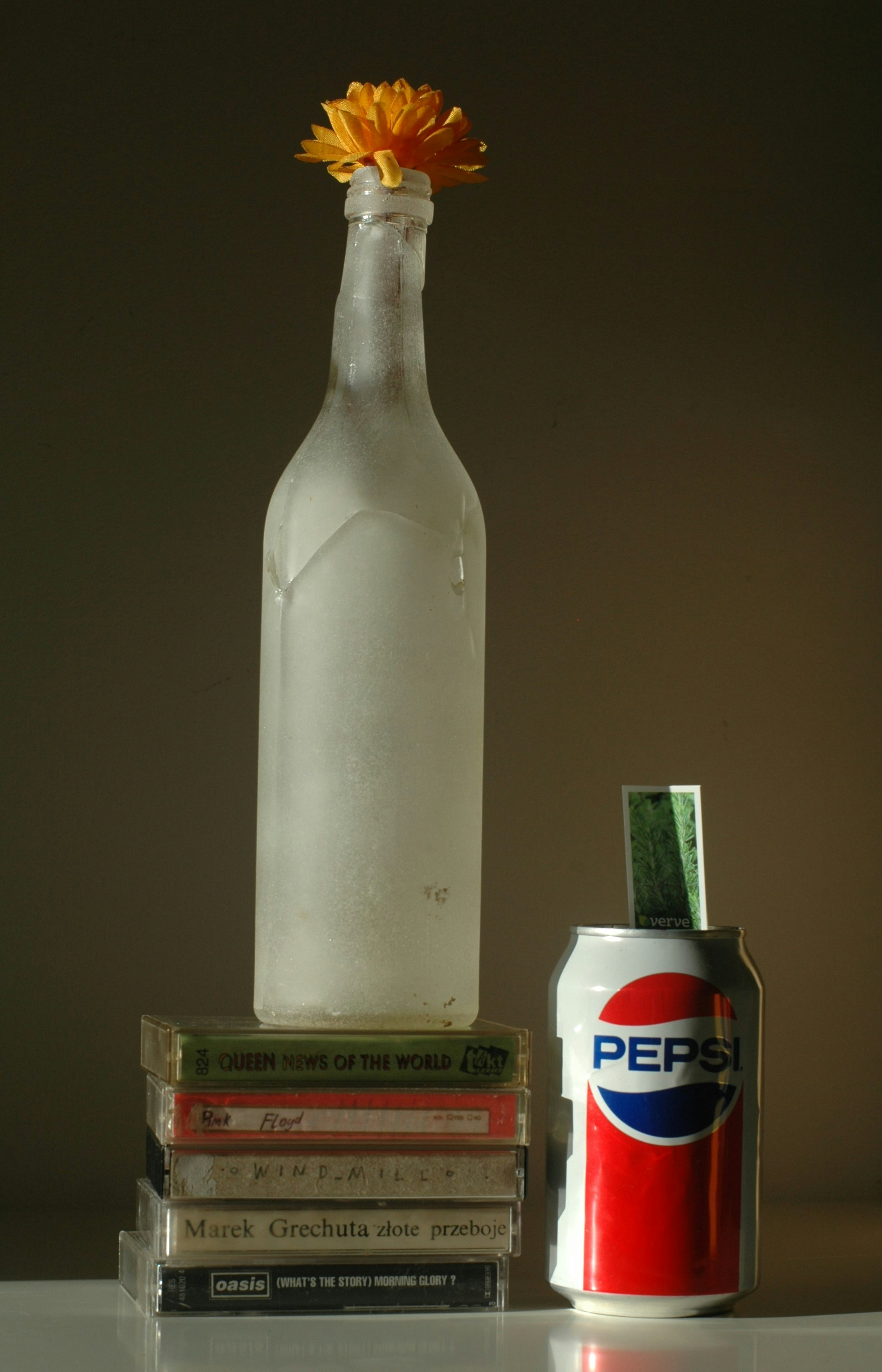 A can of pepsi next to a flower in a bottle photo – Free Alcohol Image ...