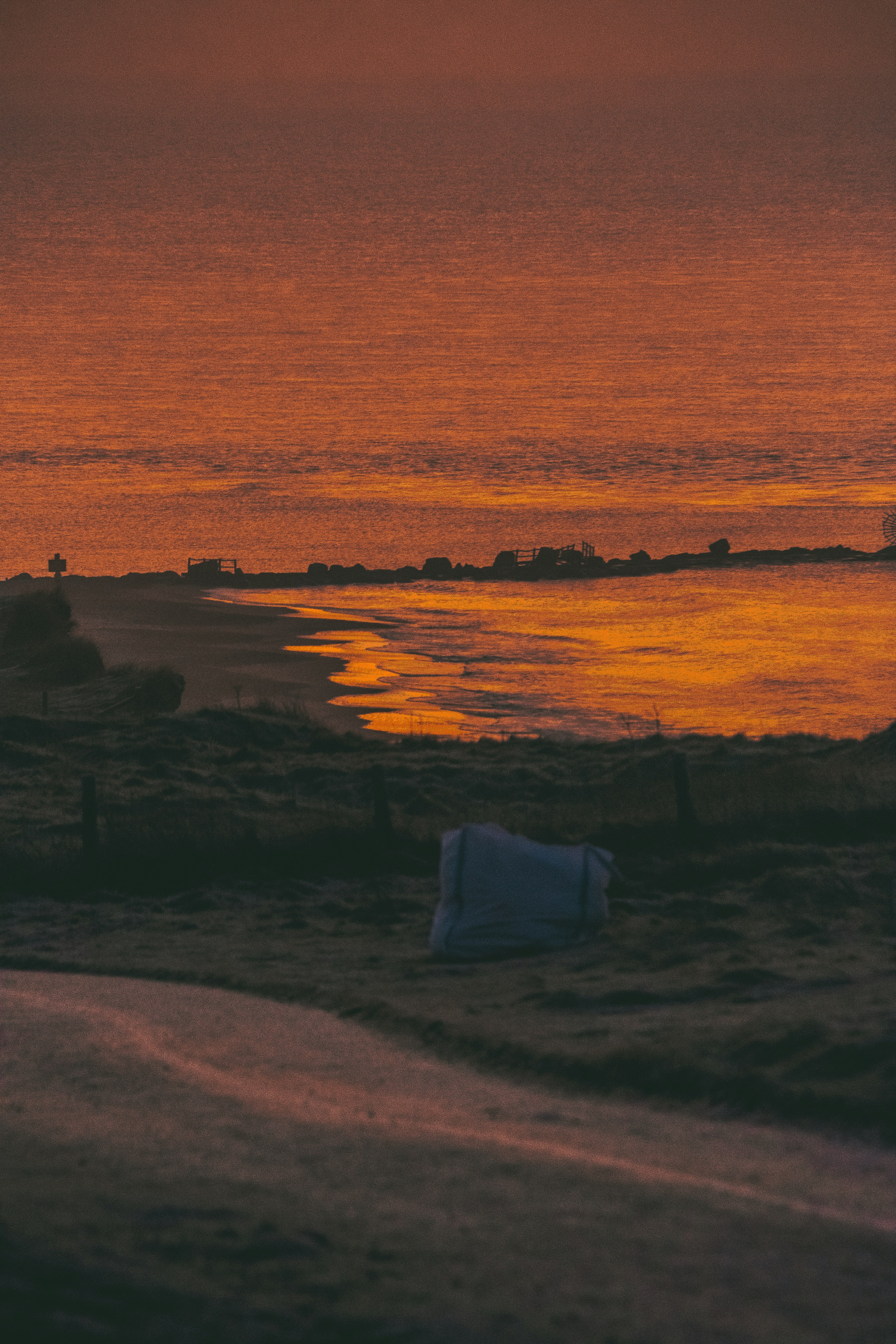 Crimson Shoreline at Dusk