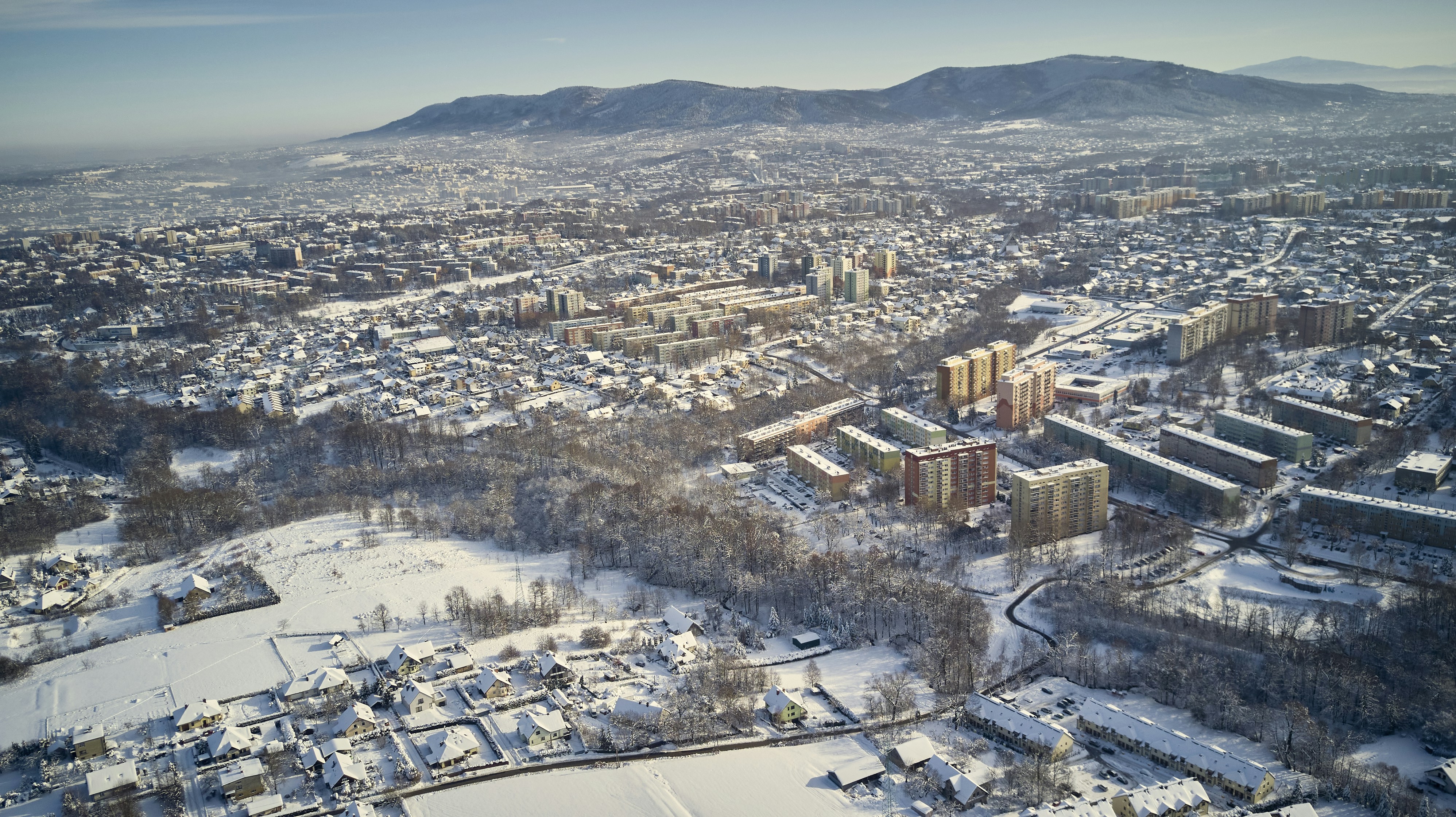 Snowbound Grid: Aerial Portrait of a Winter Cityscape