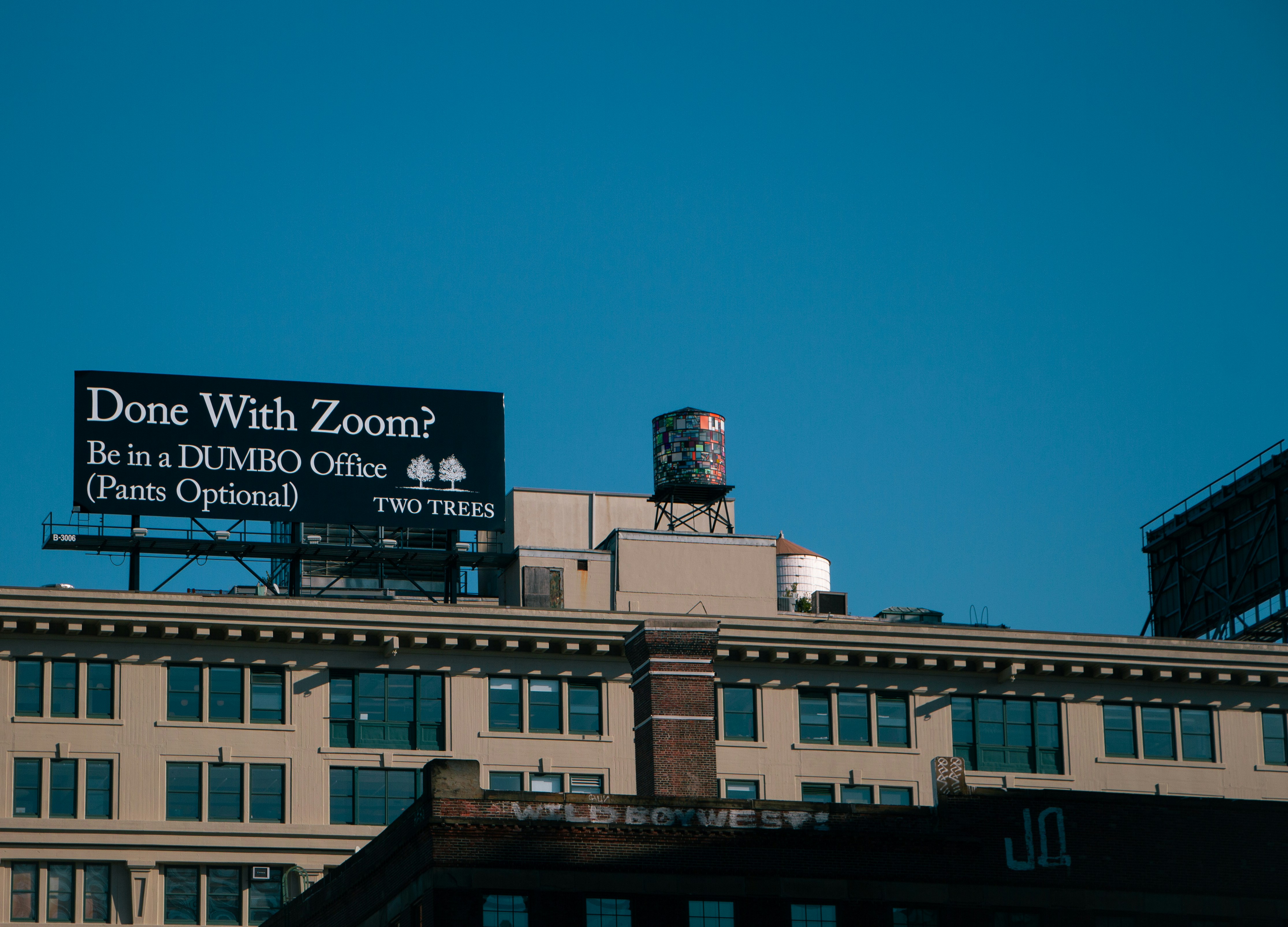 Blue Sky Over DUMBO: A Bold Billboard Guards the Brick Skyline