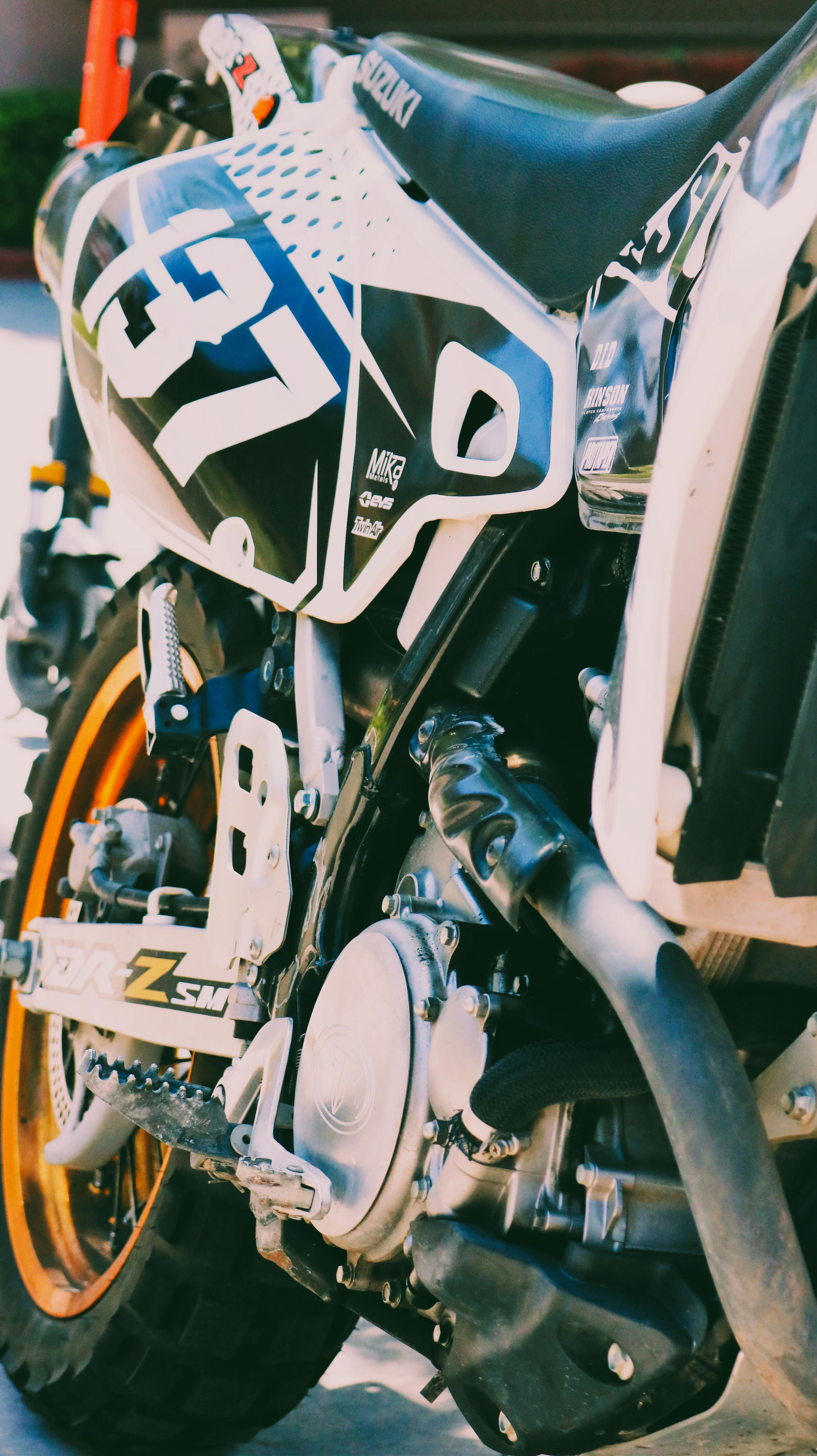 a close up of a motorcycle parked on a street