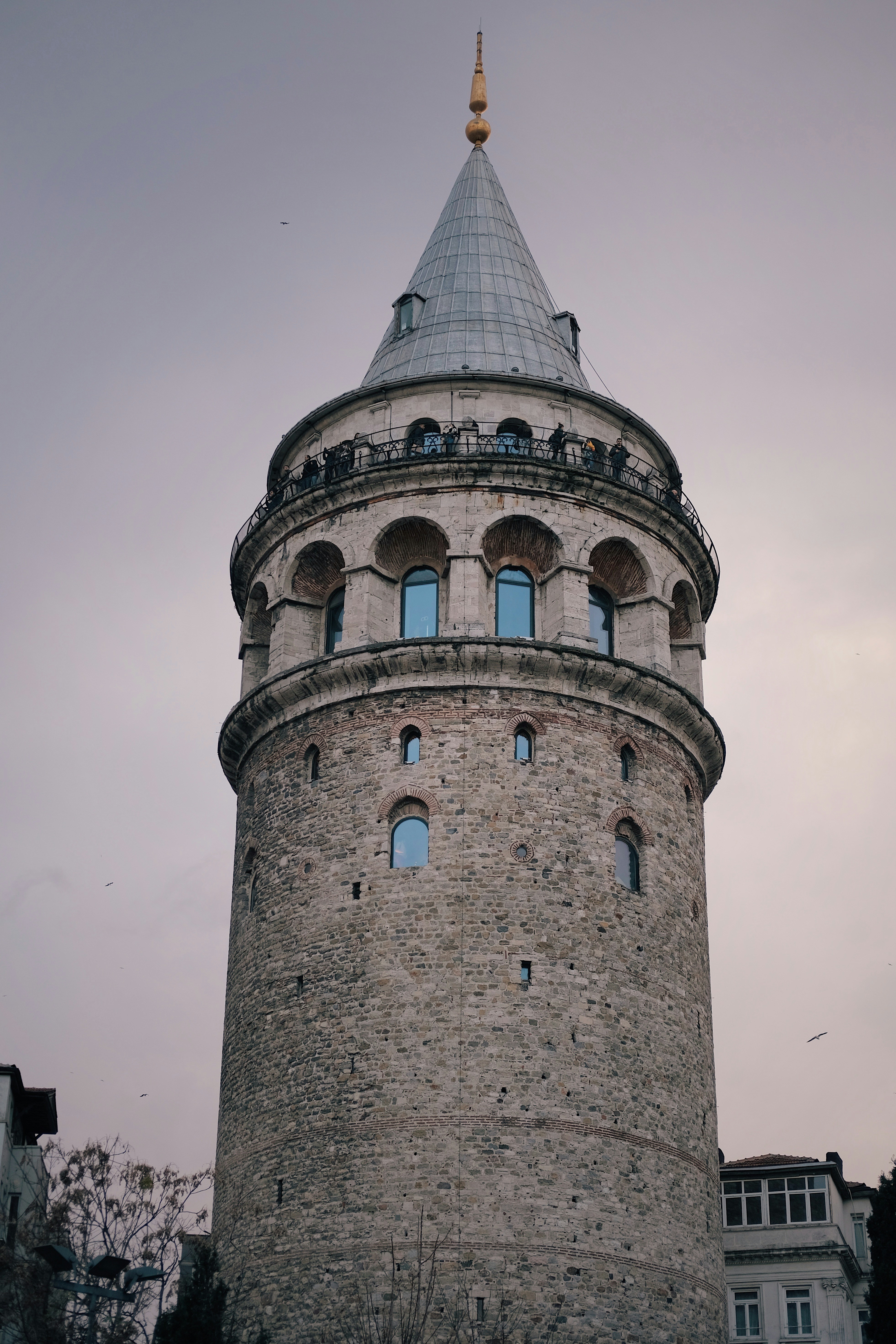 a tall tower with a clock on the top of it