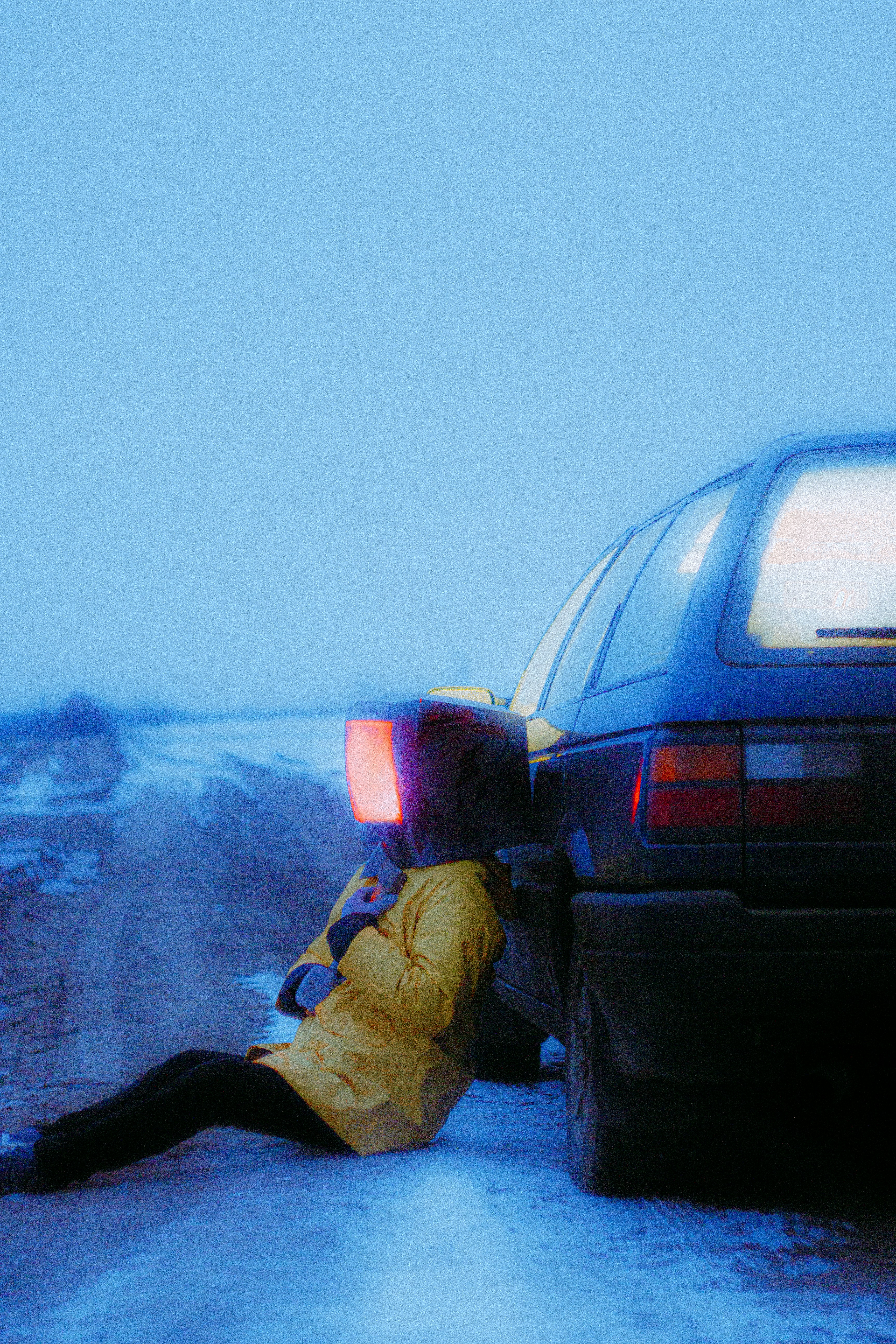 Blue Hour Standoff by the Snowbound Sedan