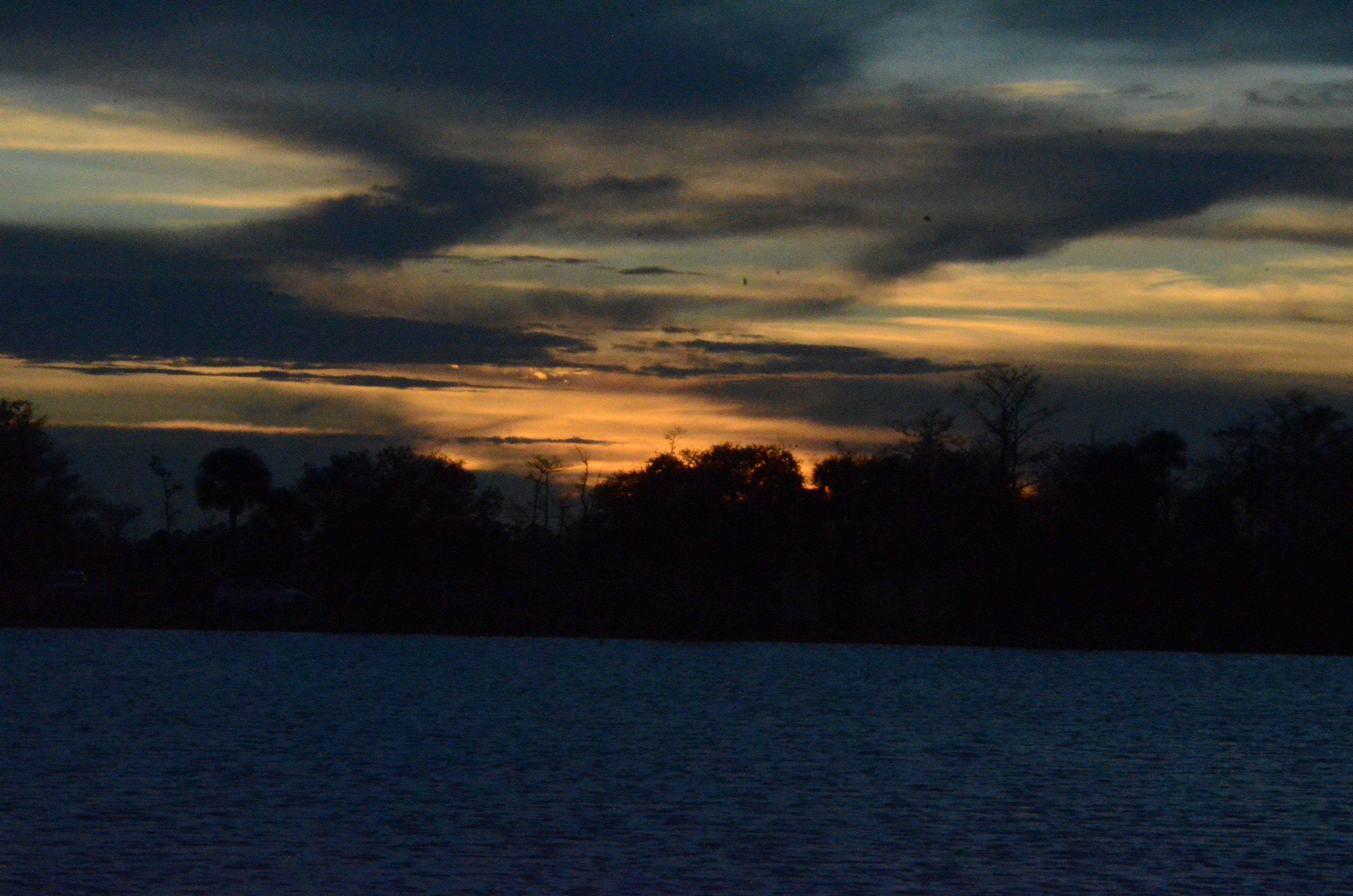 Horizon Embers over a Silent Lake at Dusk