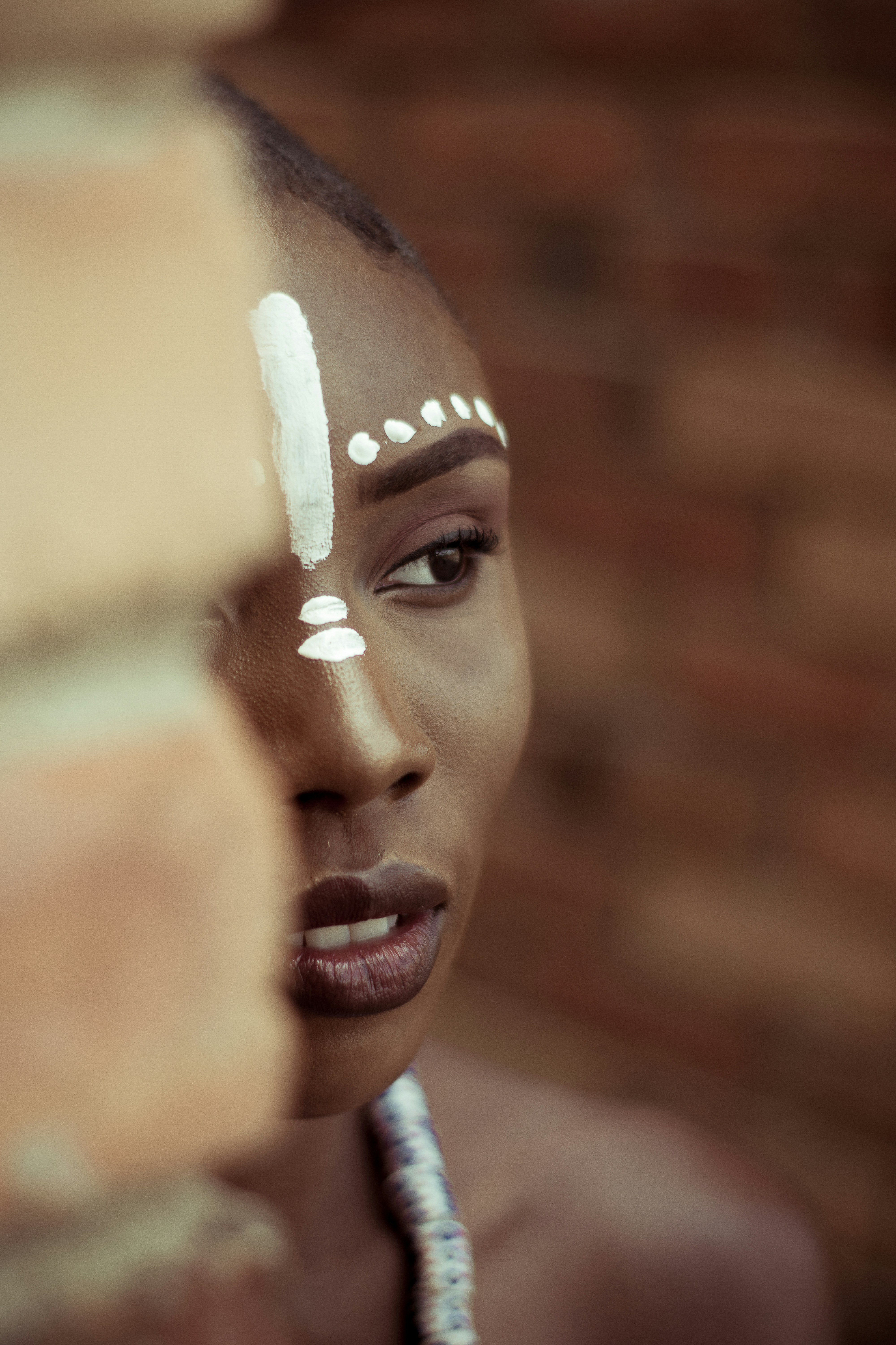 A woman's face is reflected in a mirror photo – Free Image on Unsplash