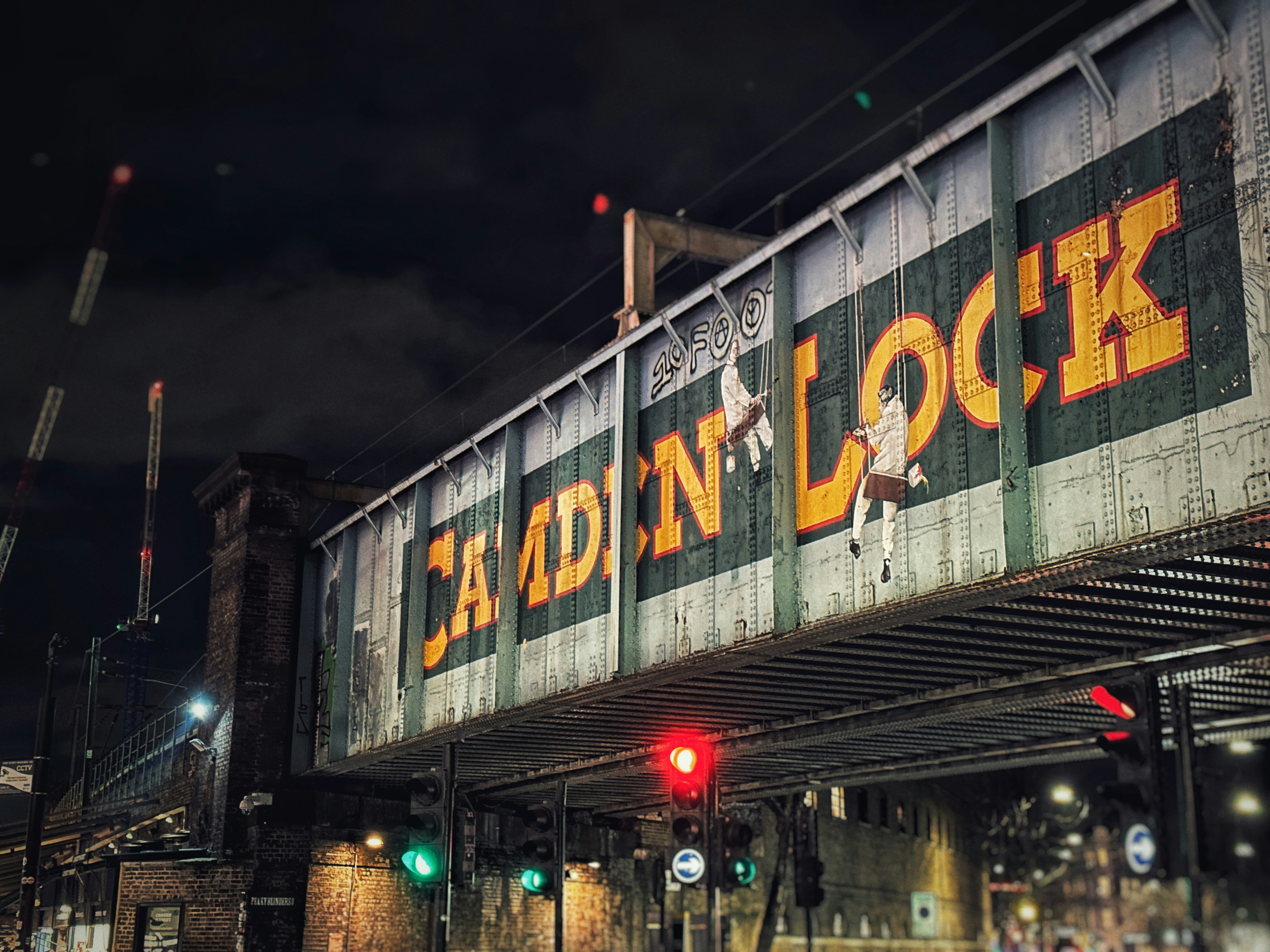 A train crossing over a bridge that reads lock lane photo – Free Camden ...