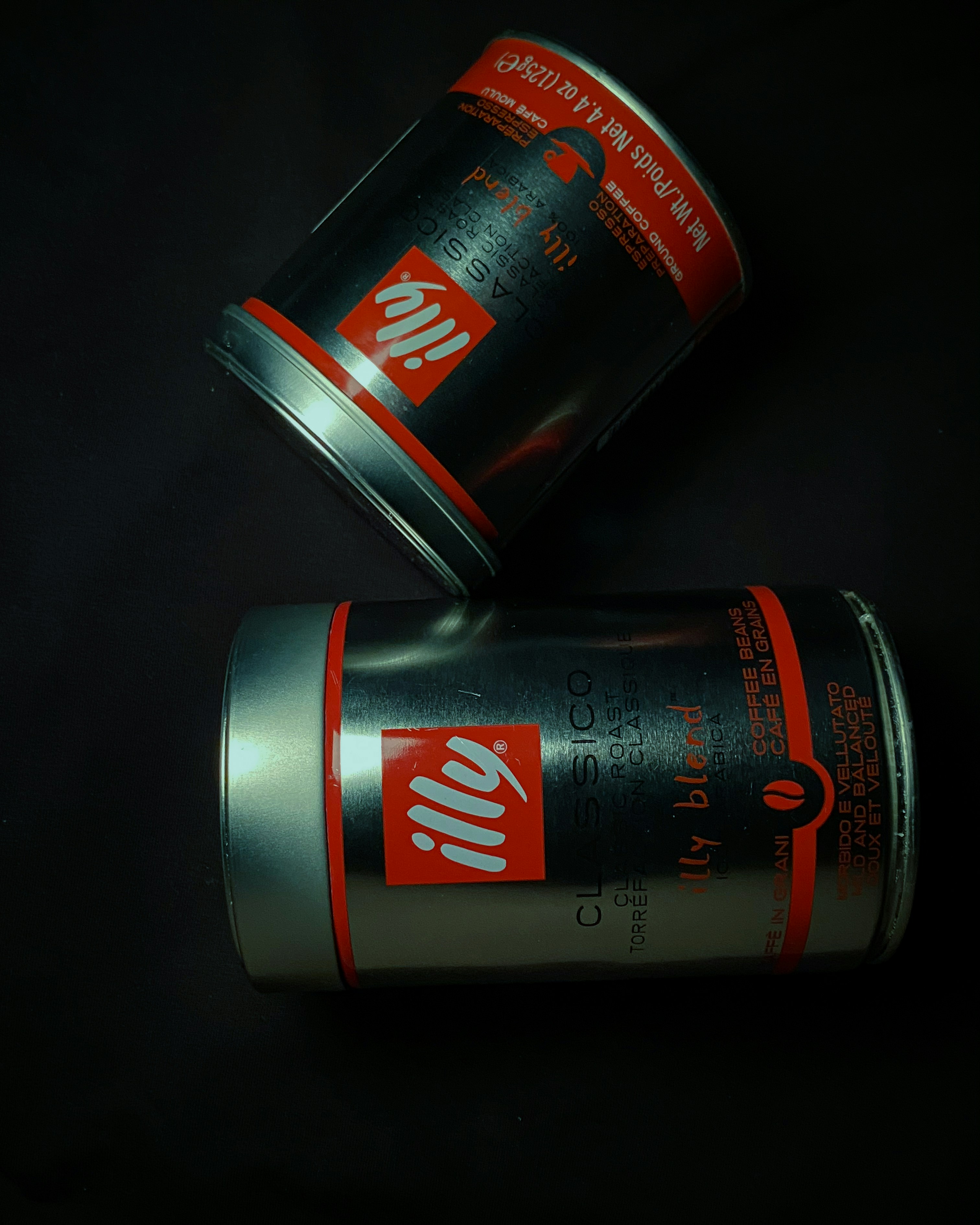 Chiaroscuro Still Life: Two illy Coffee Tins in Shadowed Light