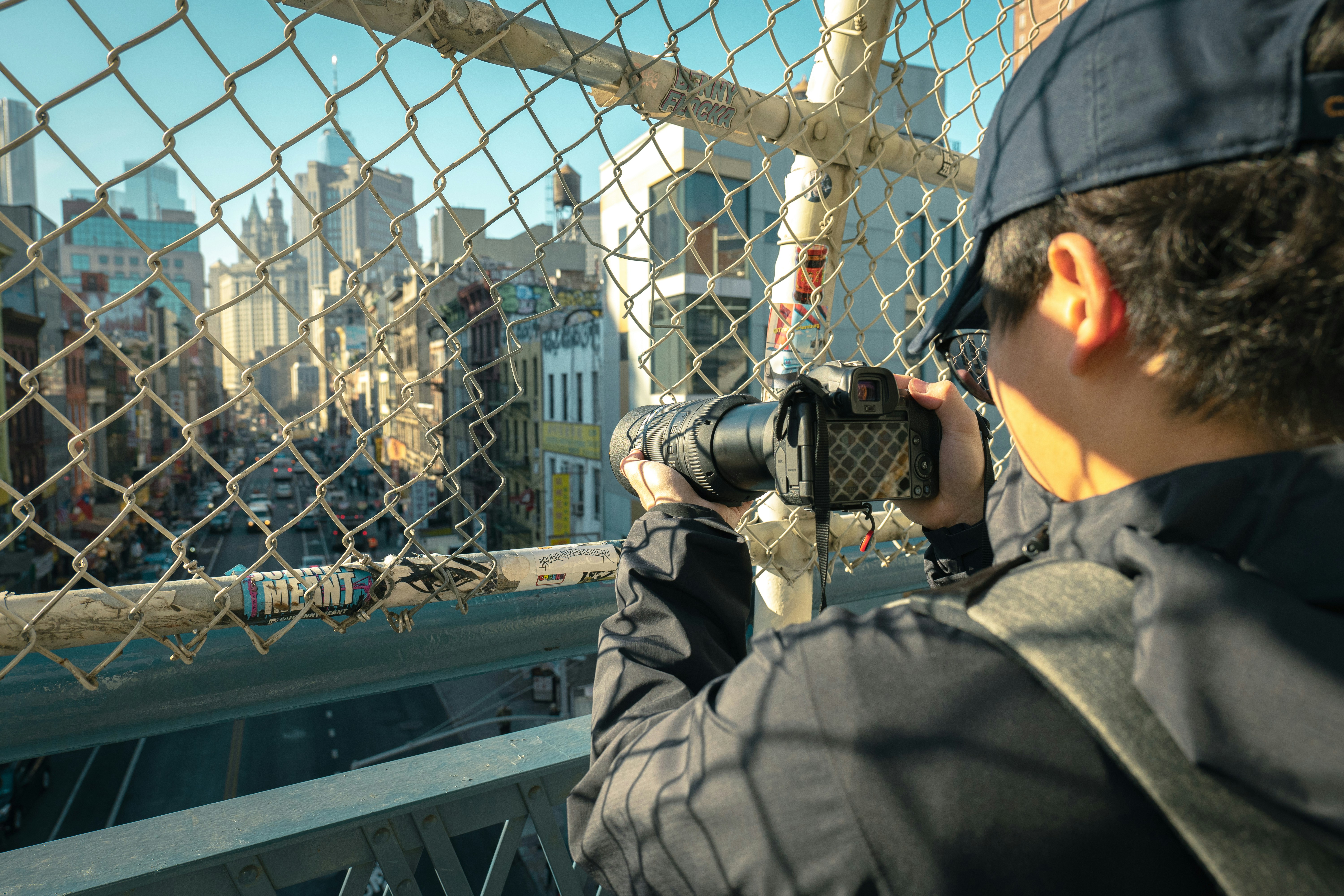 Bridgekeeper with a Telephoto Eye on the City