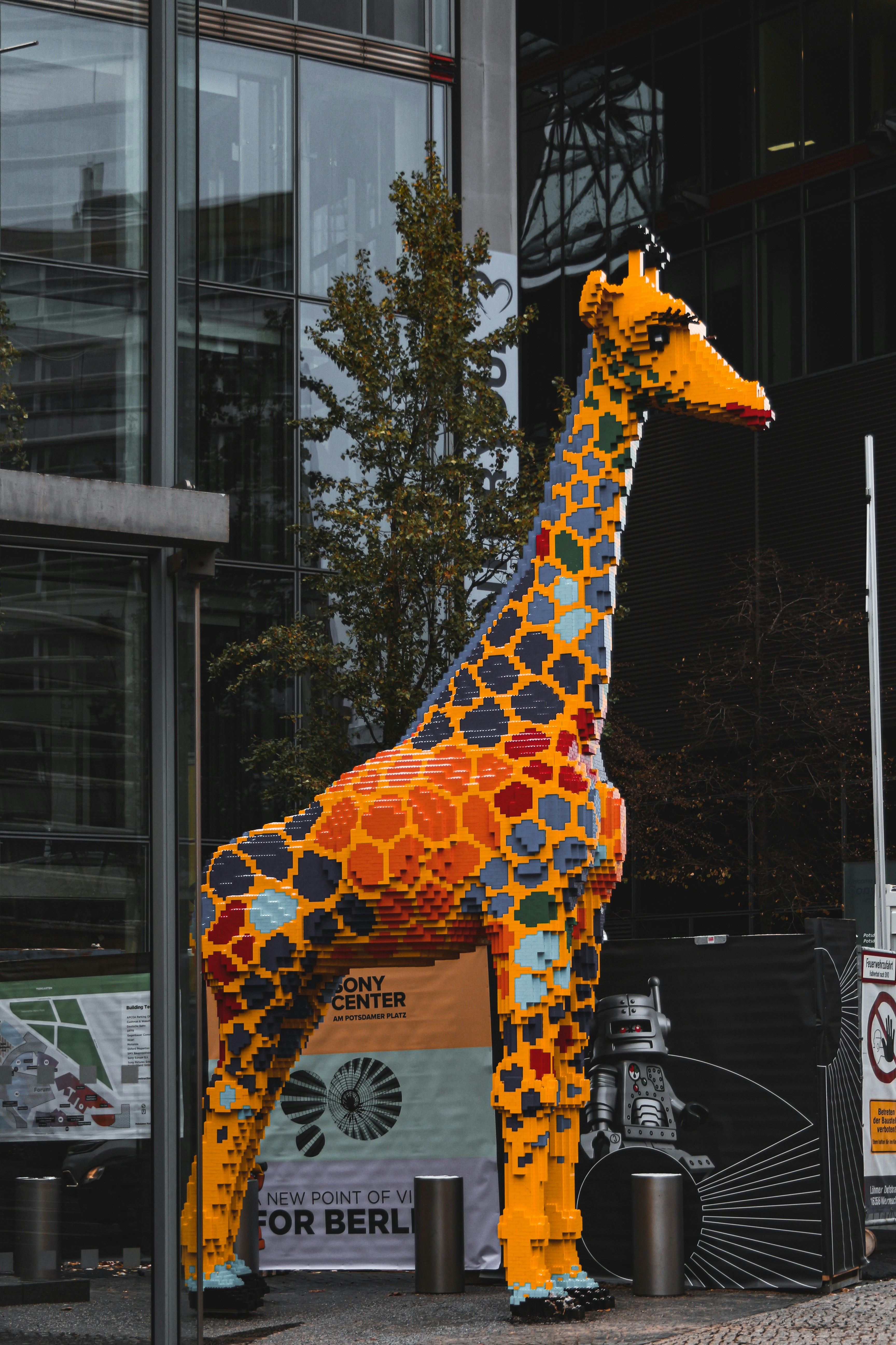a statue of a giraffe made out of legos