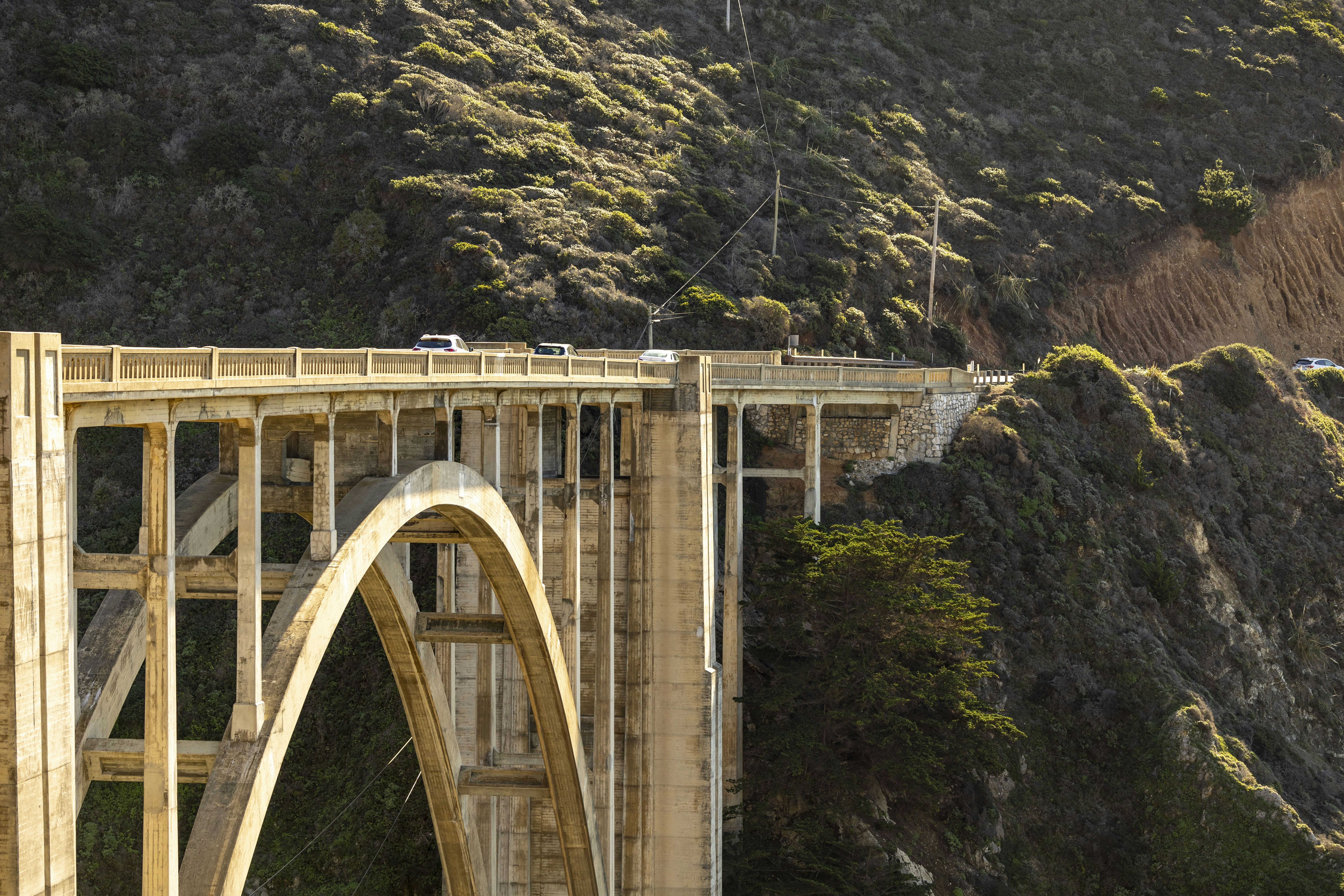 Arched Bridge Span Crossing a Cliff-side Valley