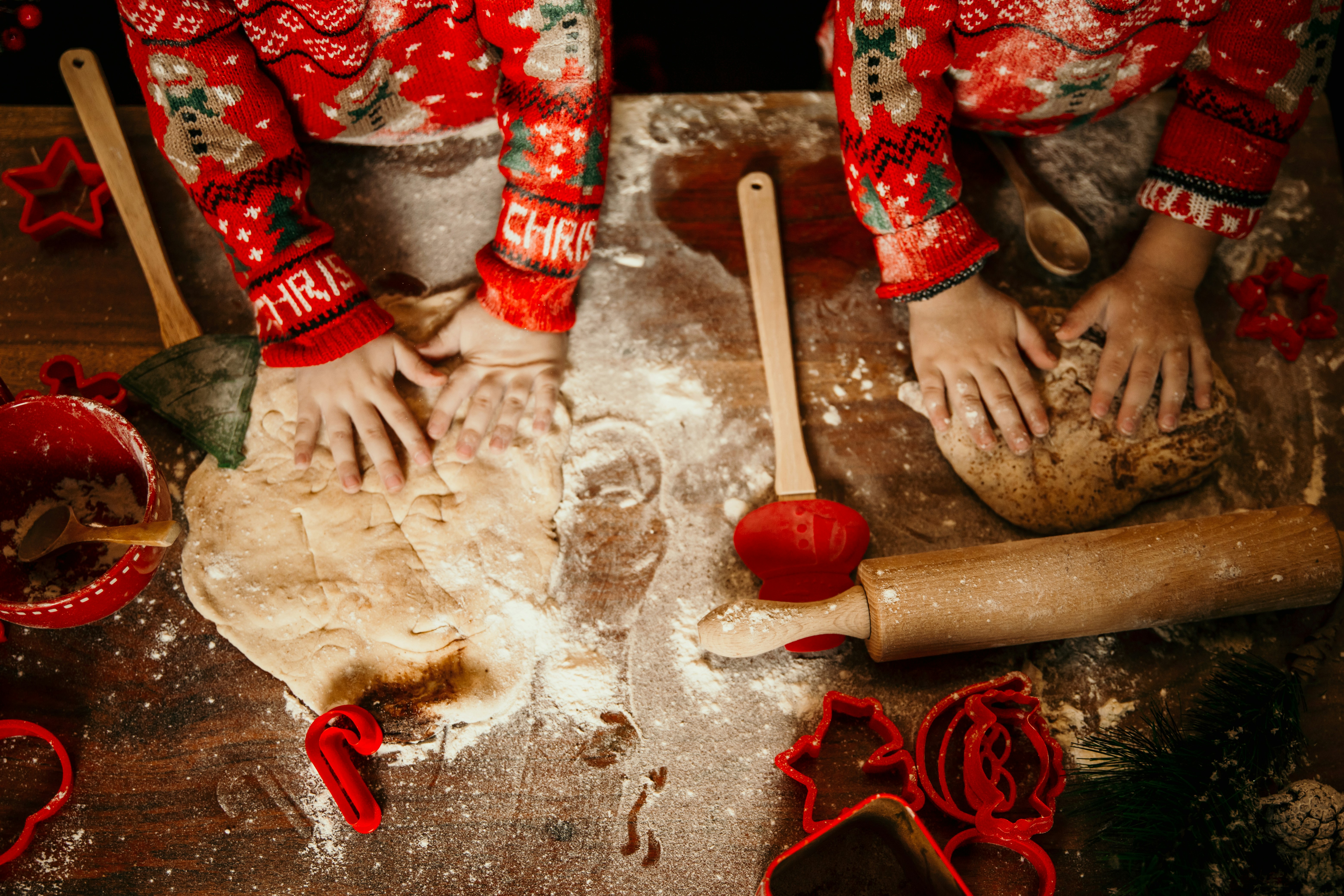 Hands in Flour: Festive Dough Craft Under Cozy Kitchen Light