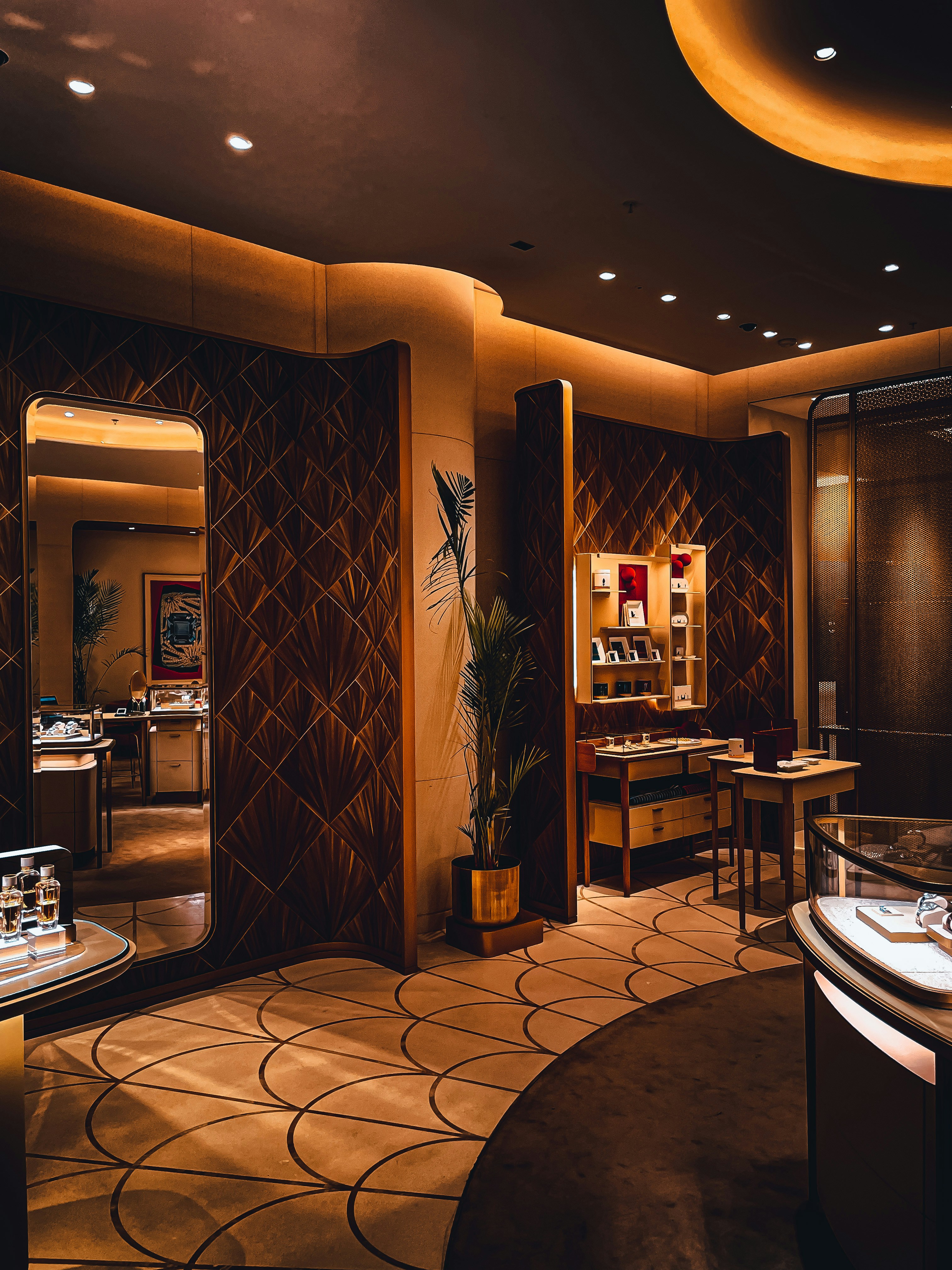 A dimly lit room with a large mirror photo – Free Shopping Image on ...