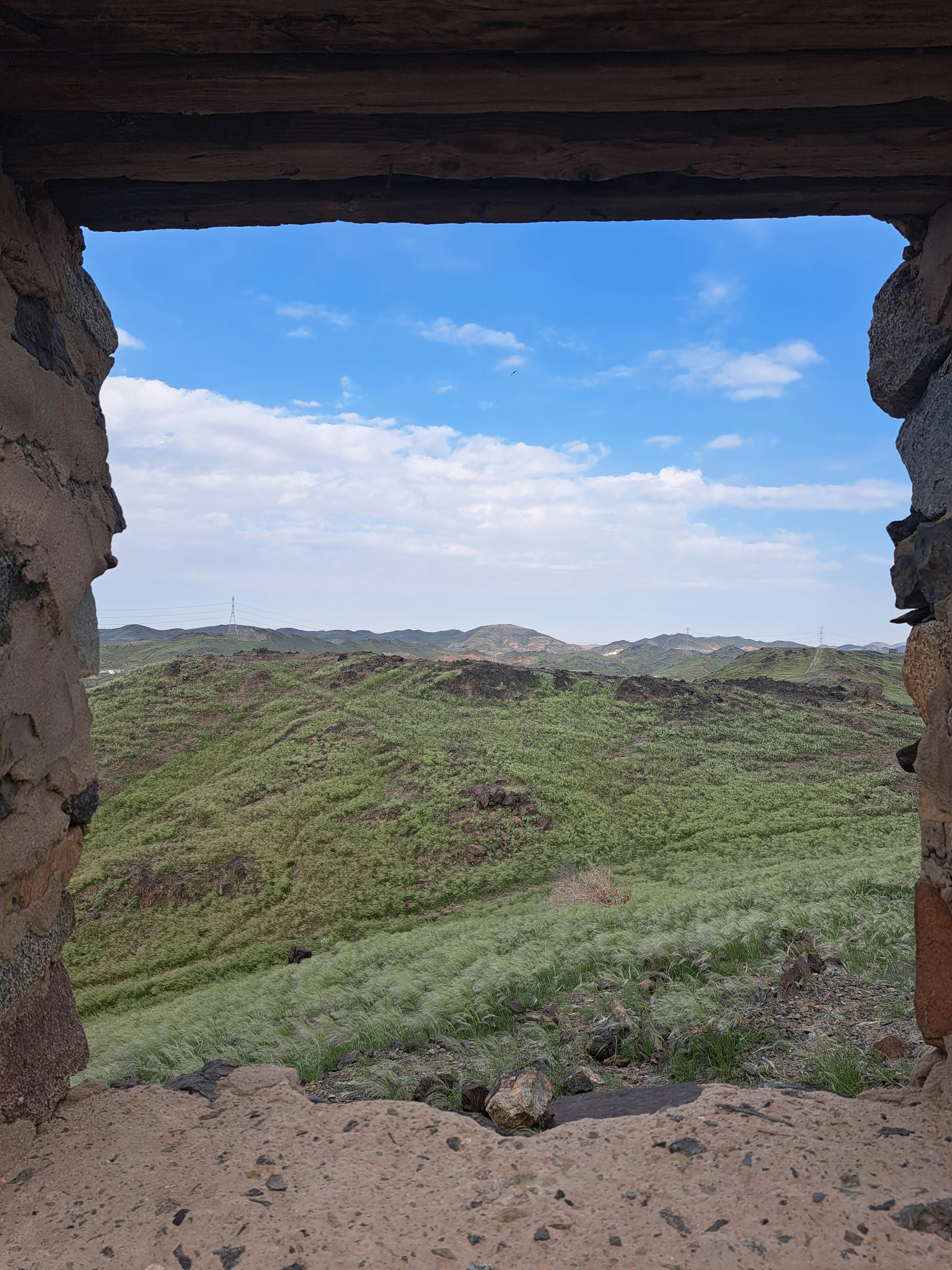 a view from a window in a stone building