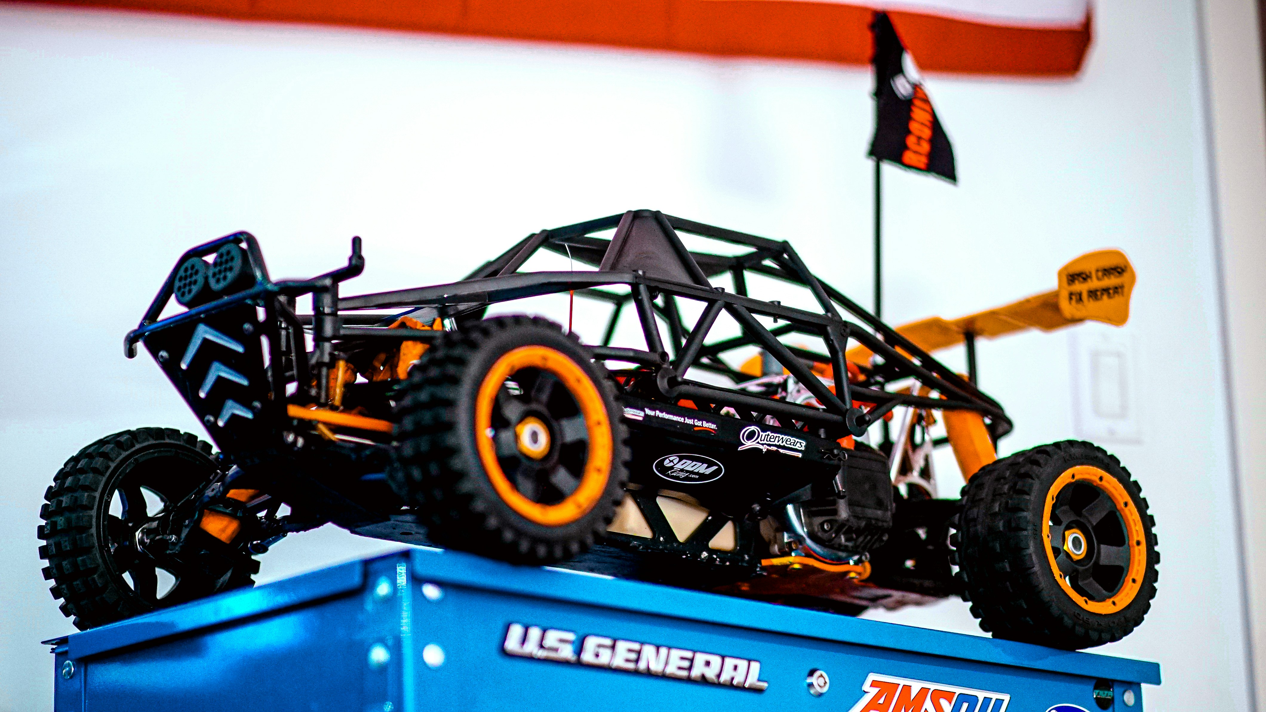 A toy car on top of a blue box photo – Free Buggy Image on Unsplash