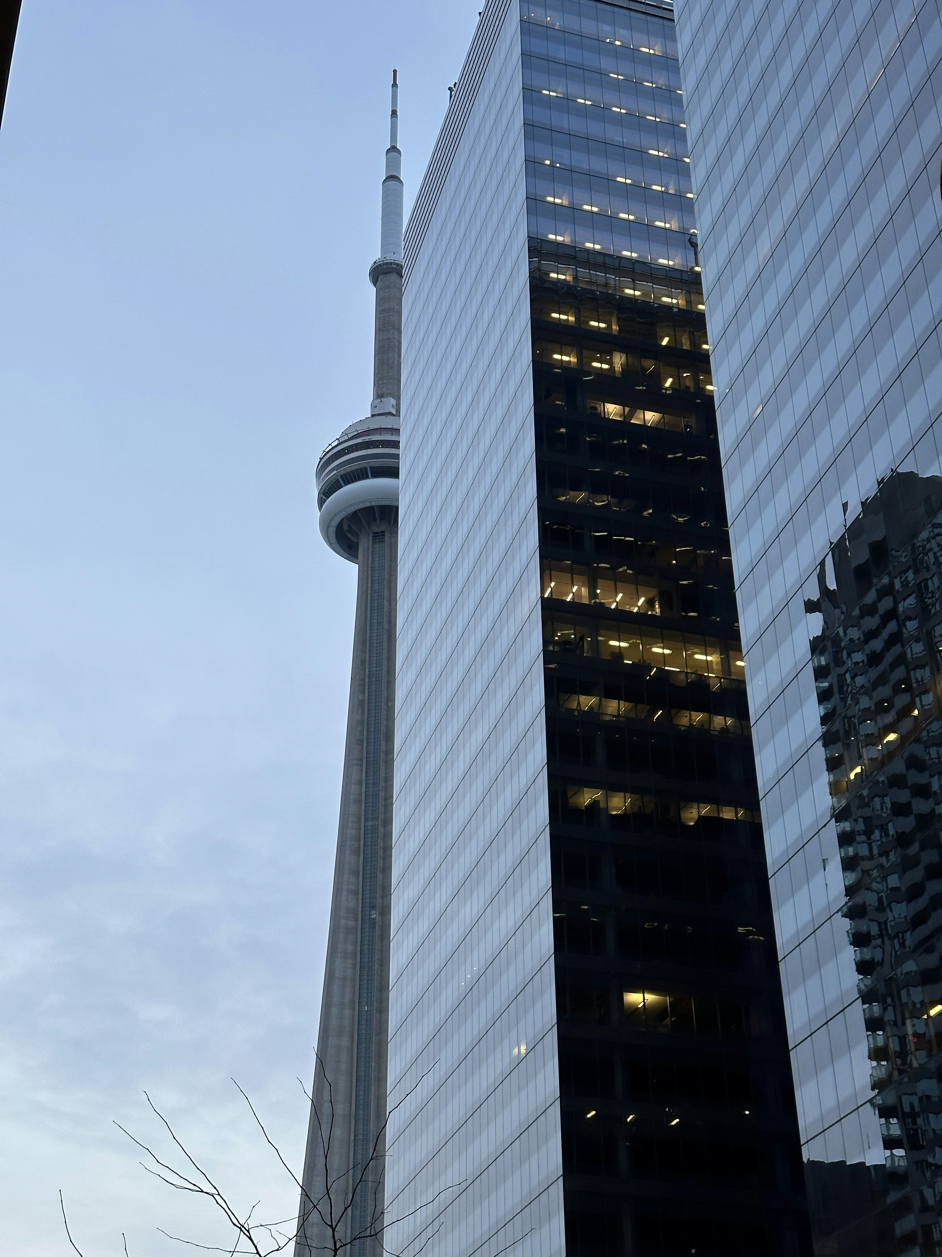 A very tall building with a very tall tower in the background photo ...