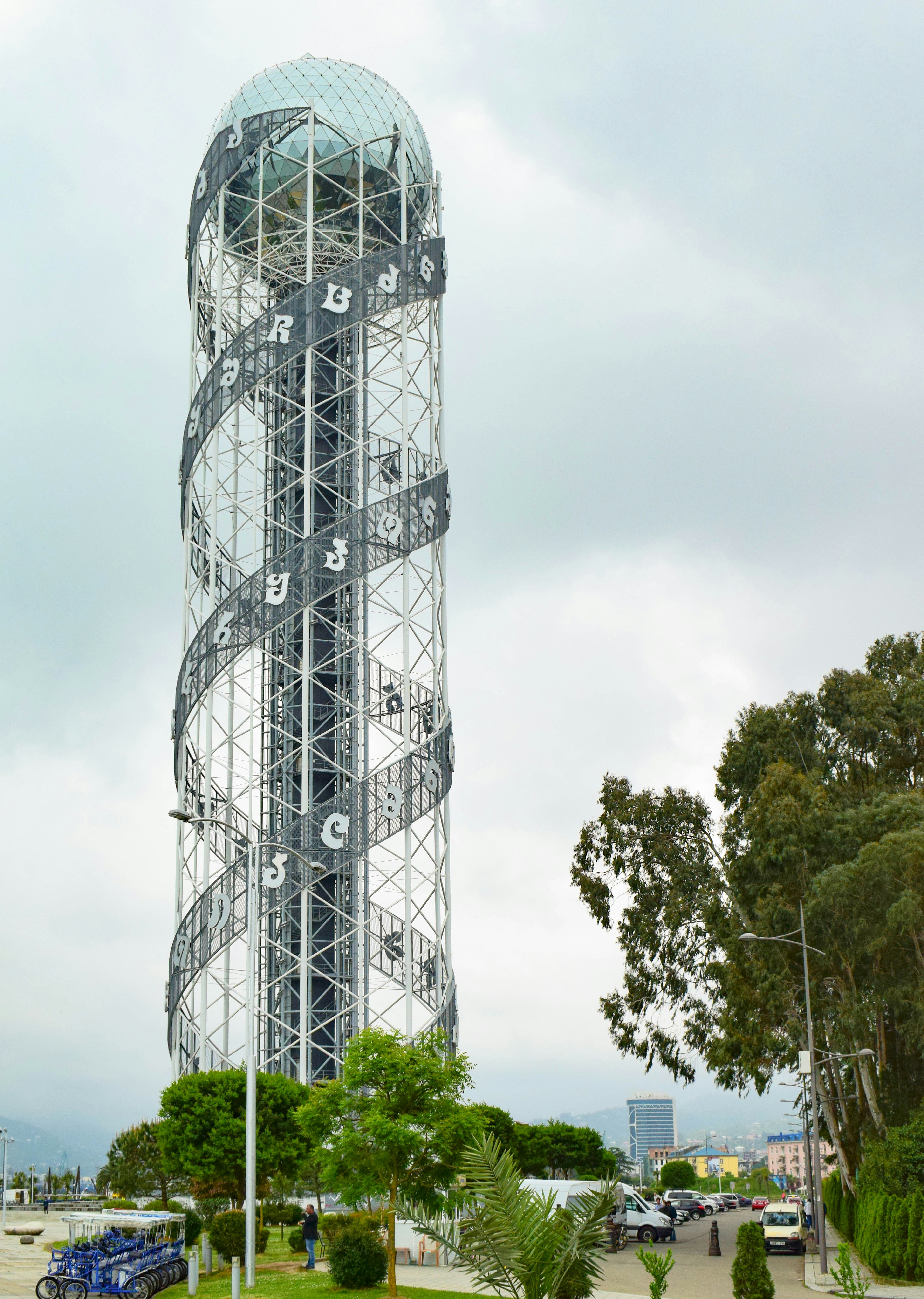 a tall tower with a clock on the side of it