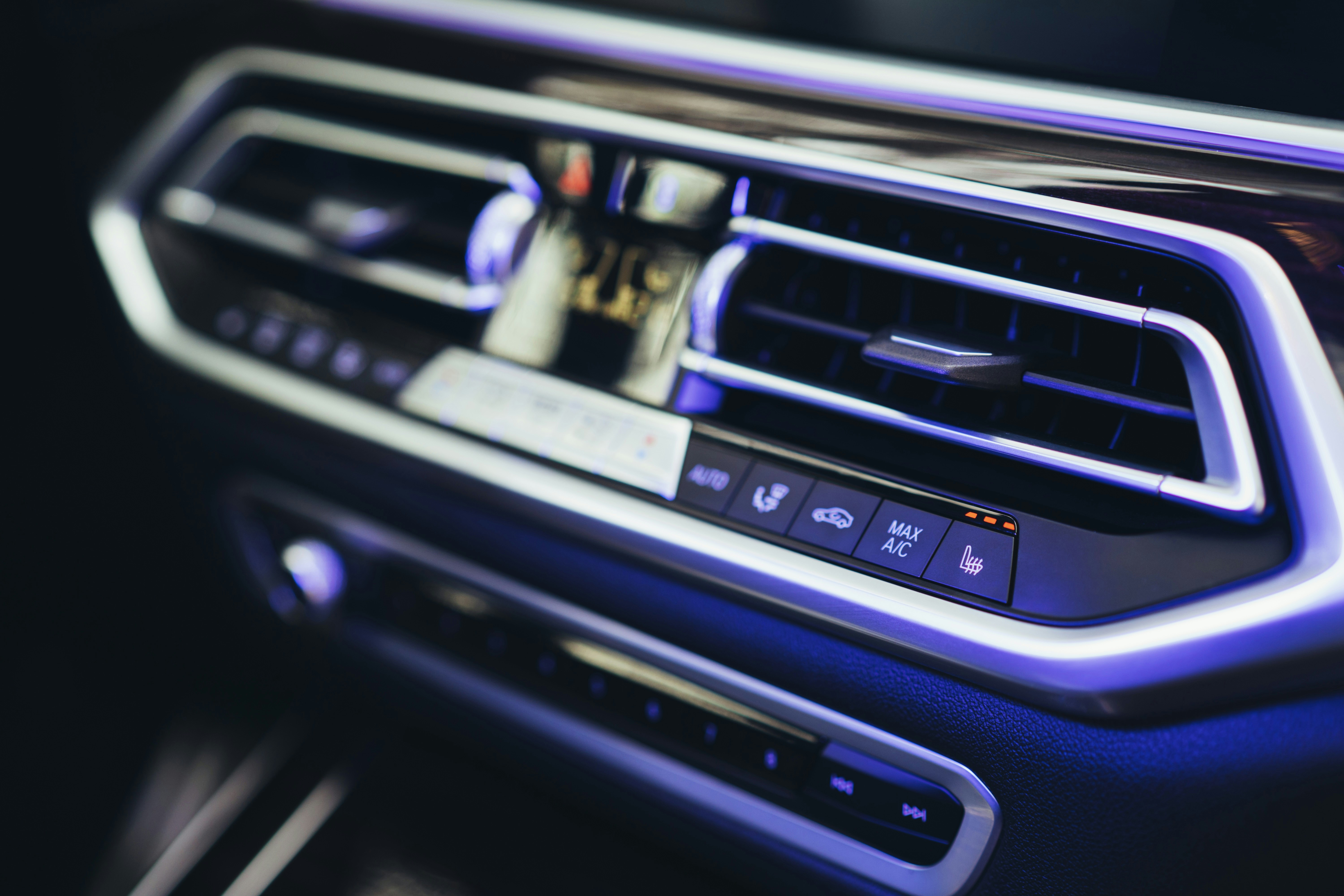 Chrome Vents and Ambient Glow: Car Cabin Focus