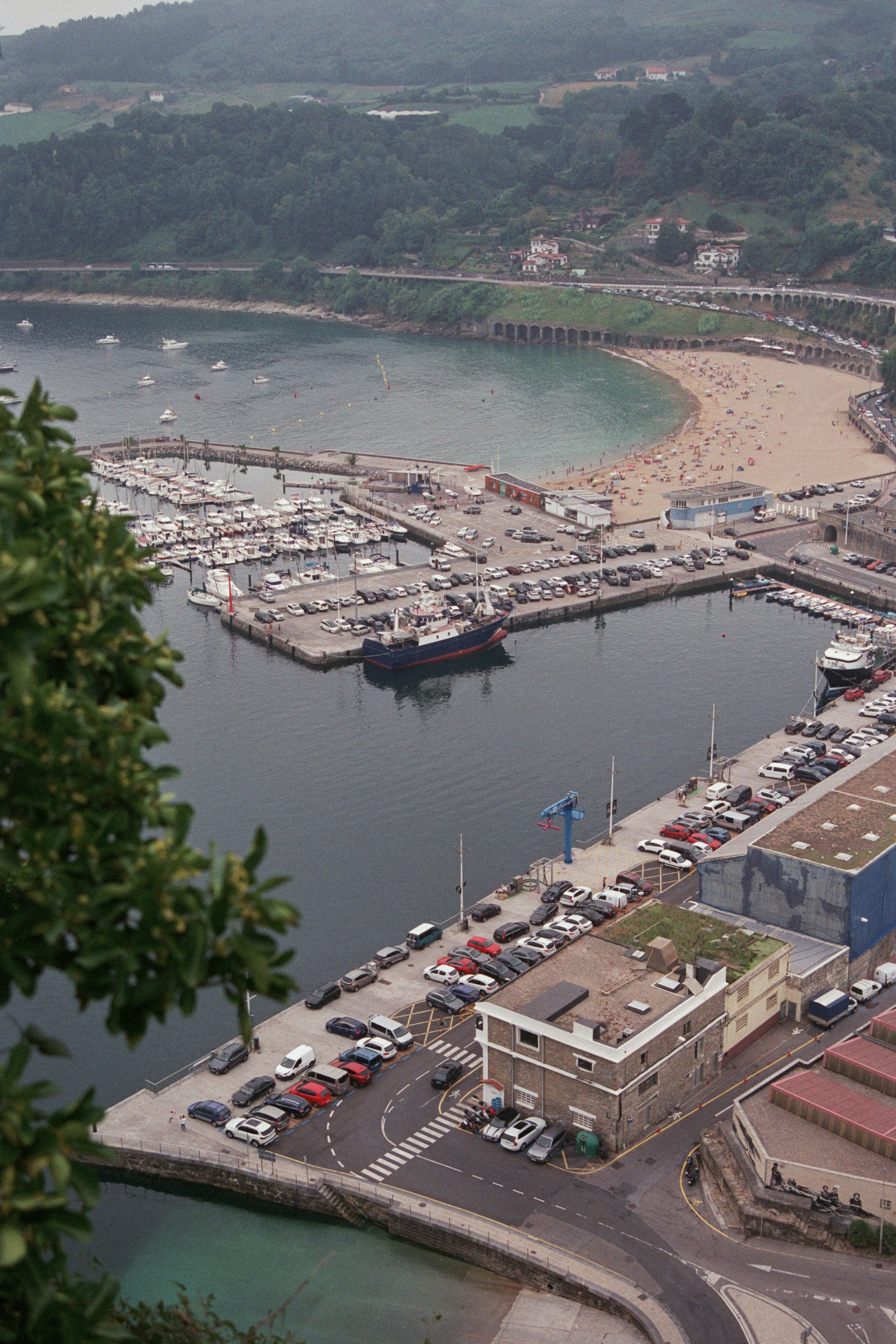 An aerial view of a harbor with a large boat dock photo – Free Beach ...