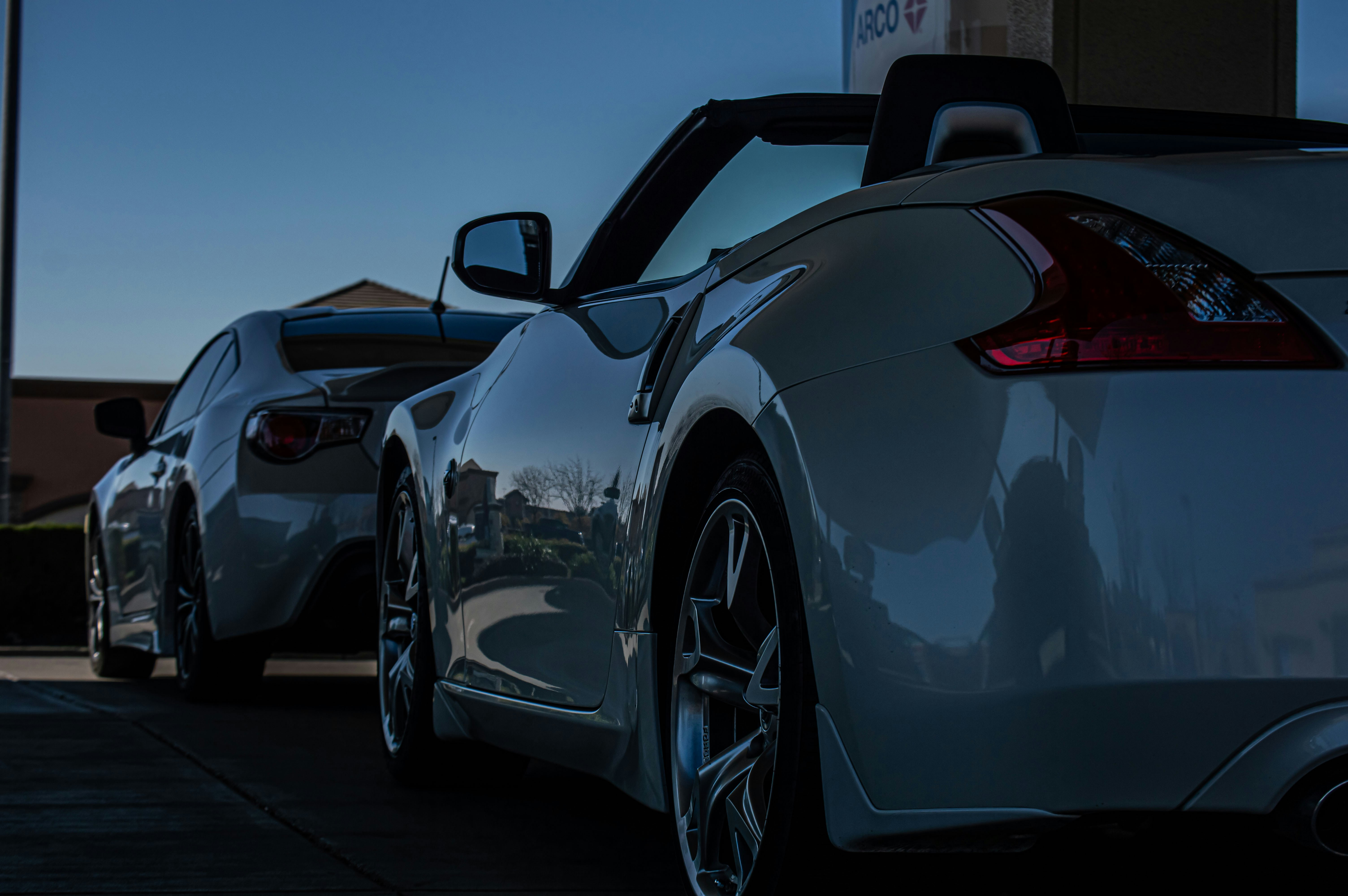 a couple of cars parked next to each other