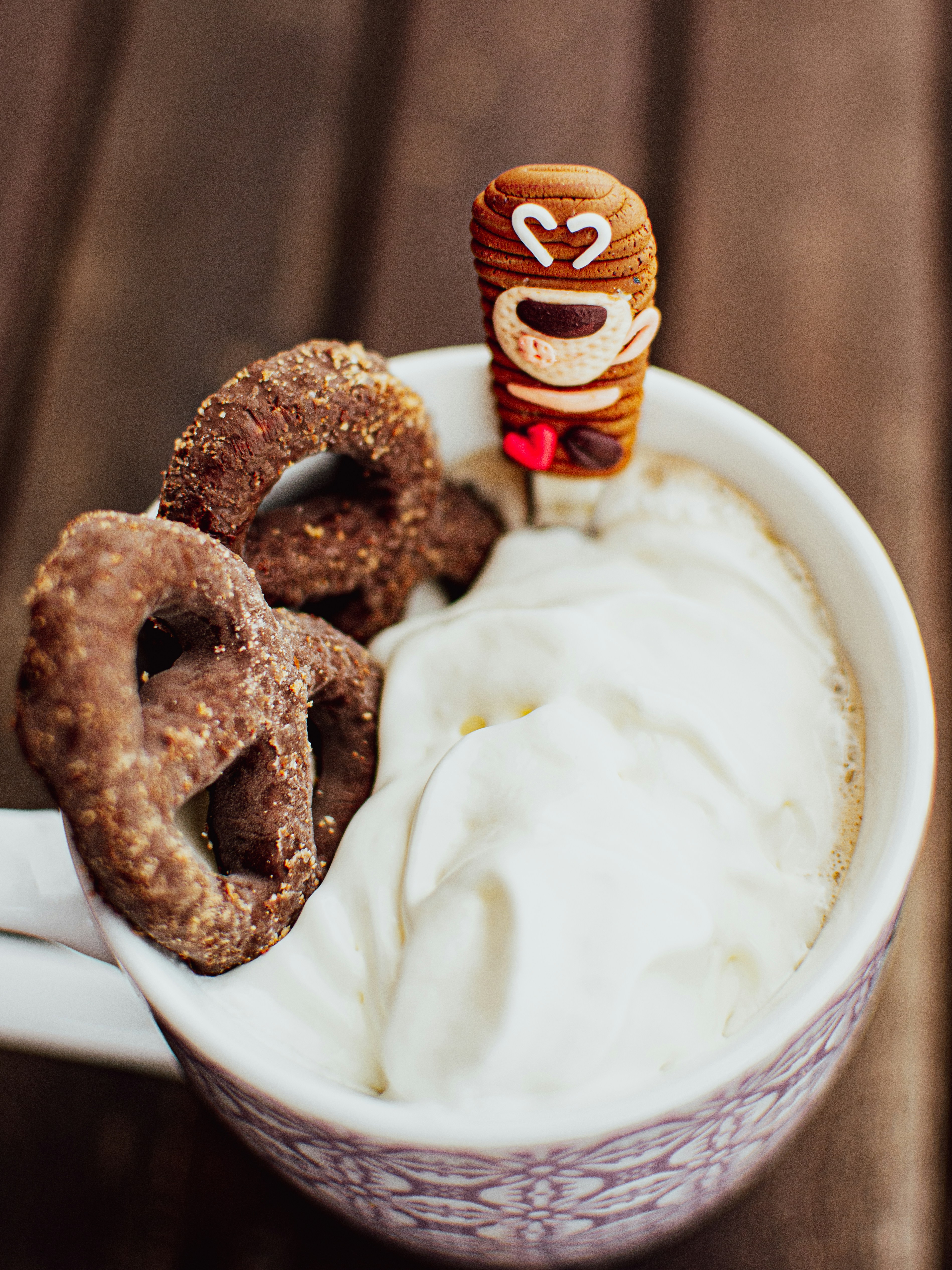 A cup filled with whipped cream and pretzels photo – Free Coffee Image ...