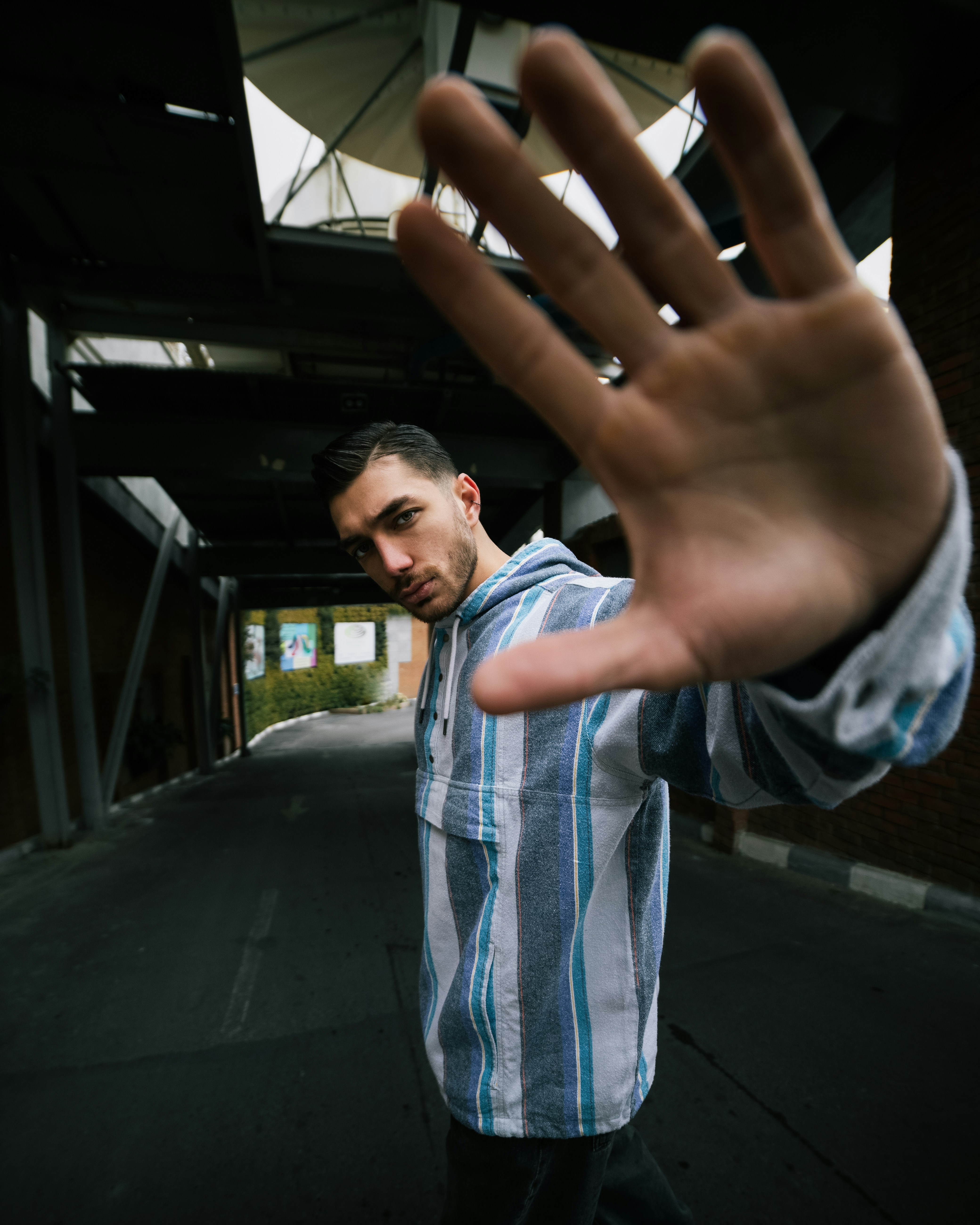 A man making a stop sign with his hand photo – Free Portrait Image on ...