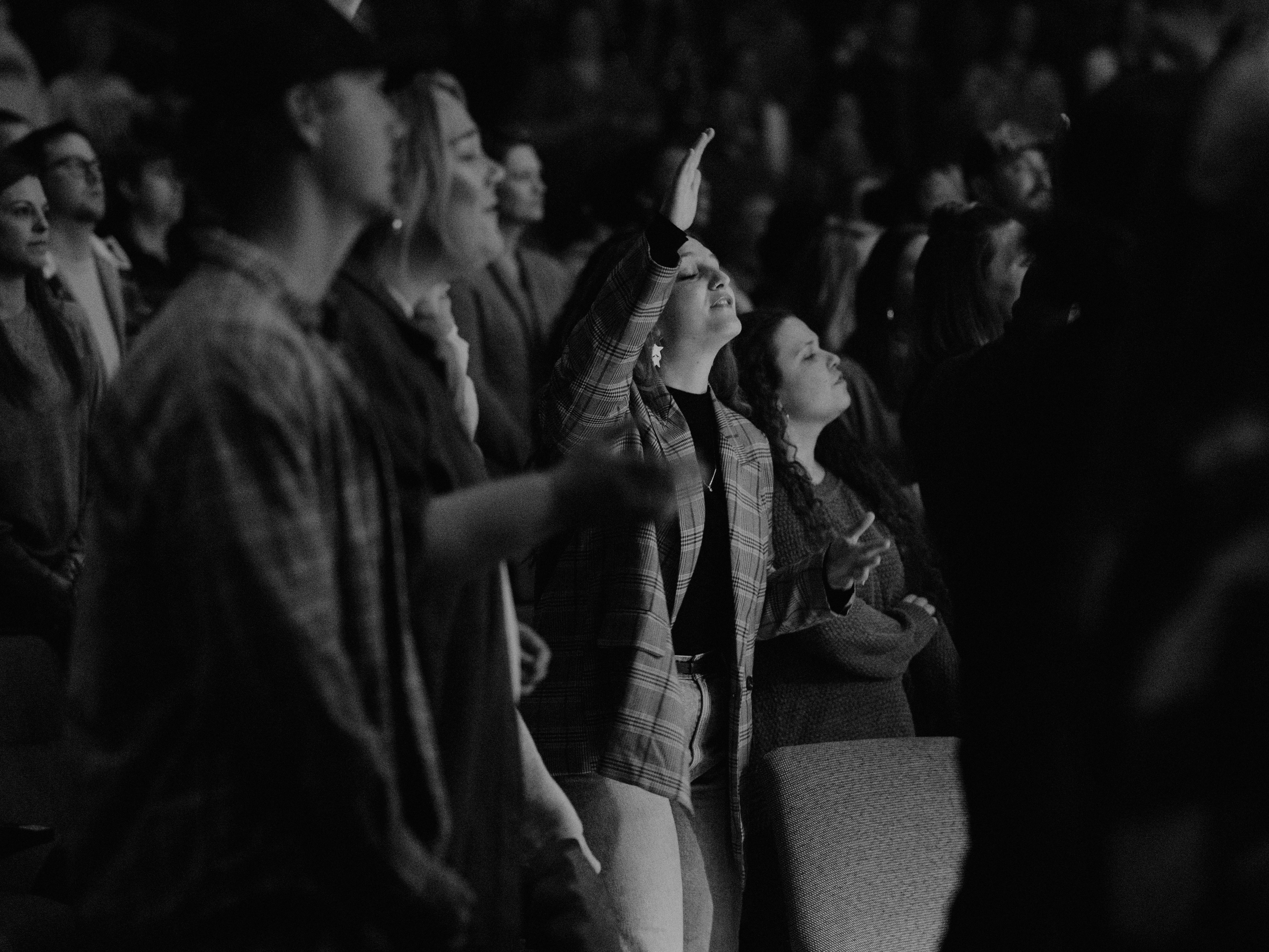 female worshipper in crowd