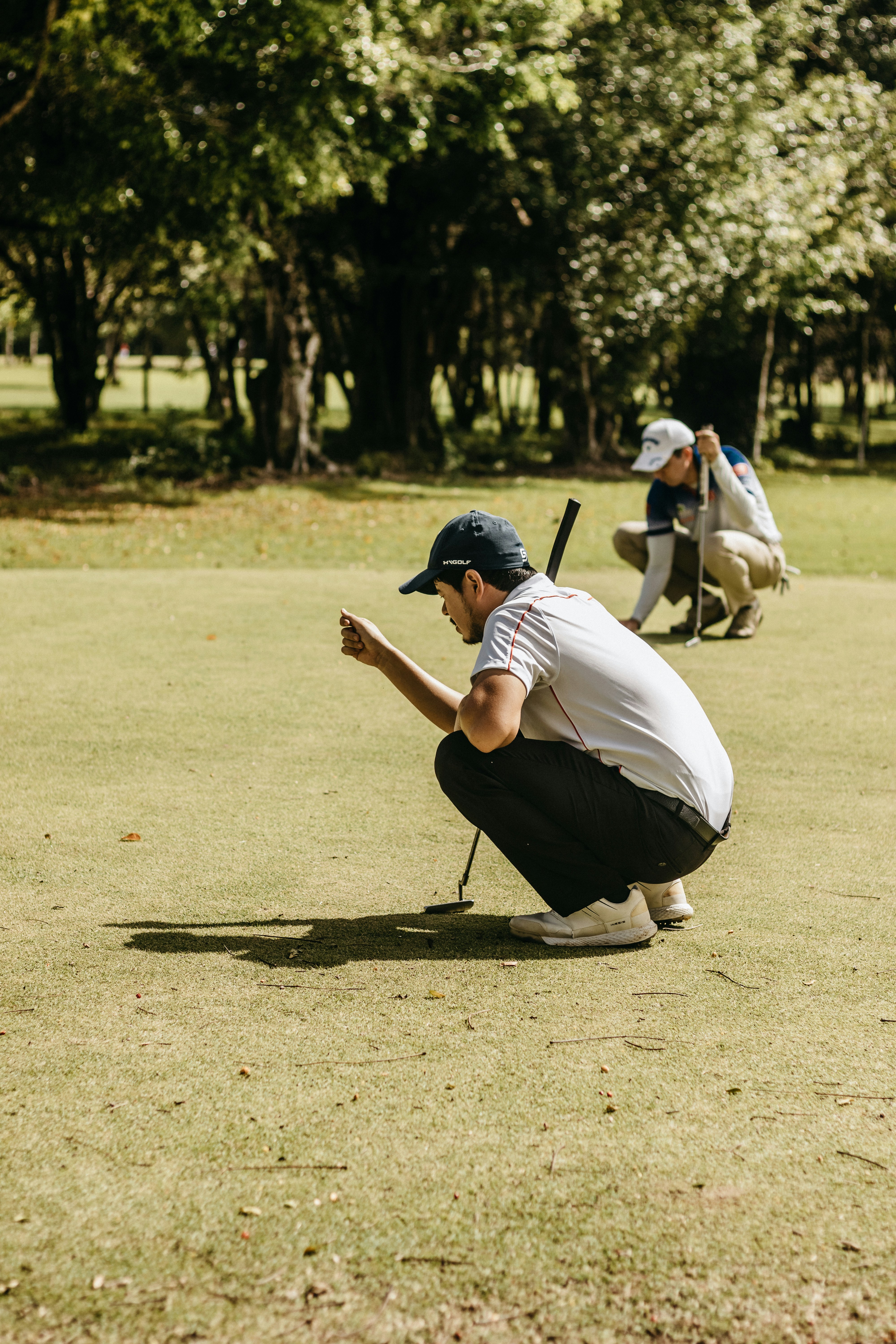 A man kneeling down holding a baseball bat photo – Free People Image on ...