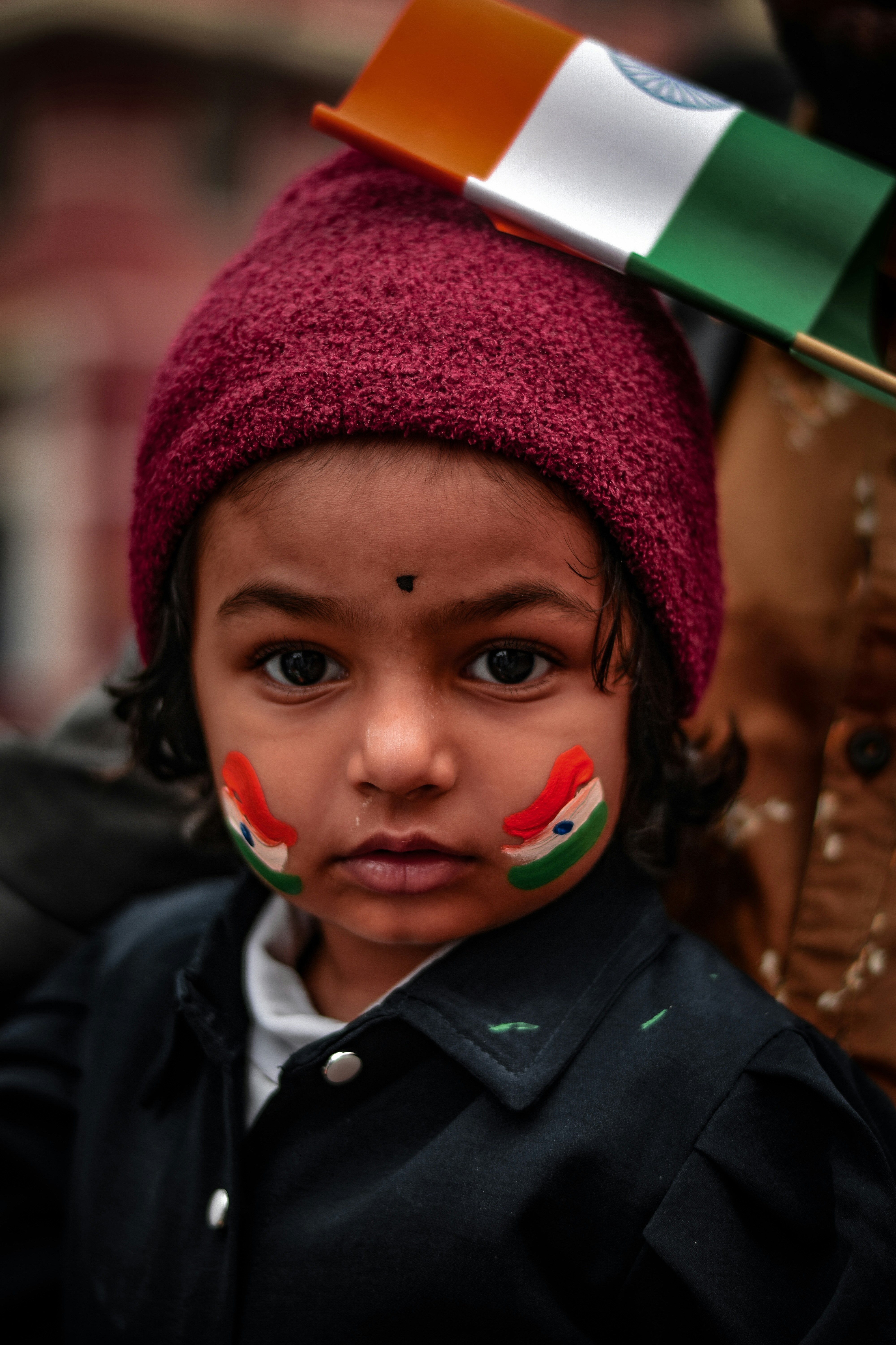 Gaze Under the Maroon Cap: A Portrait of Flag Face Paint