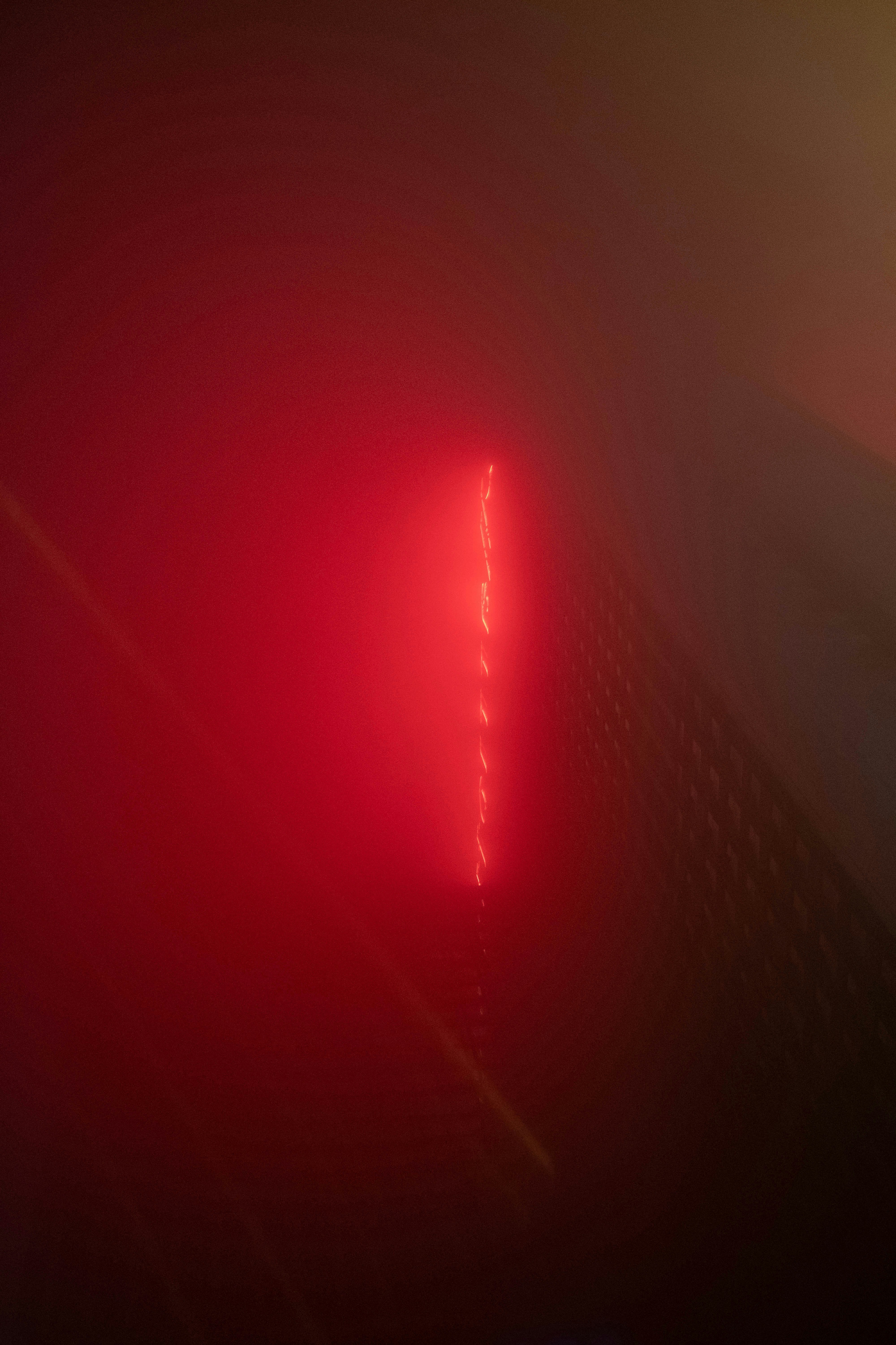 A red light shines brightly in the dark photo – Free Flare Image on ...