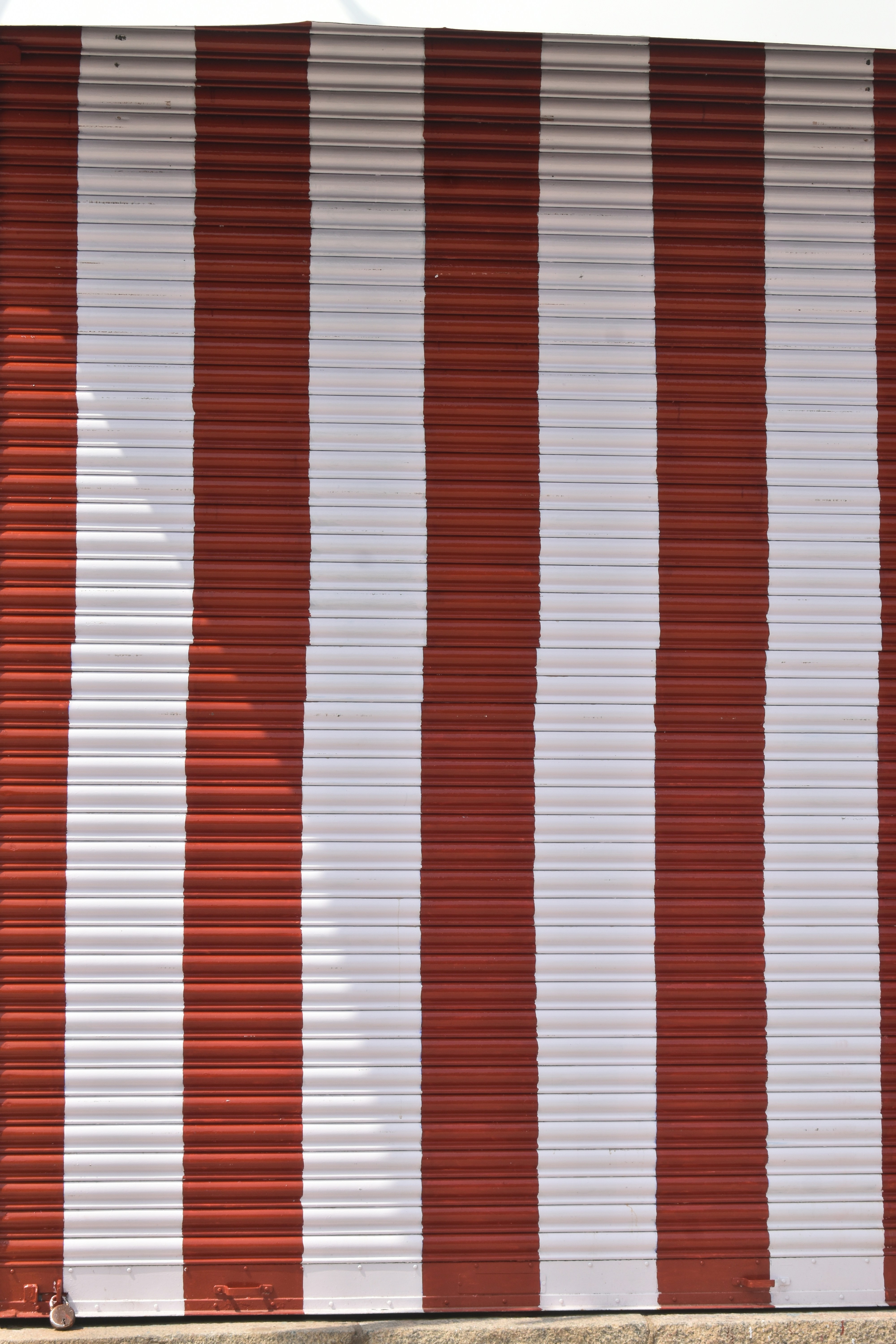 Vertical Stripes: A Red-and-White Industrial Rhythm