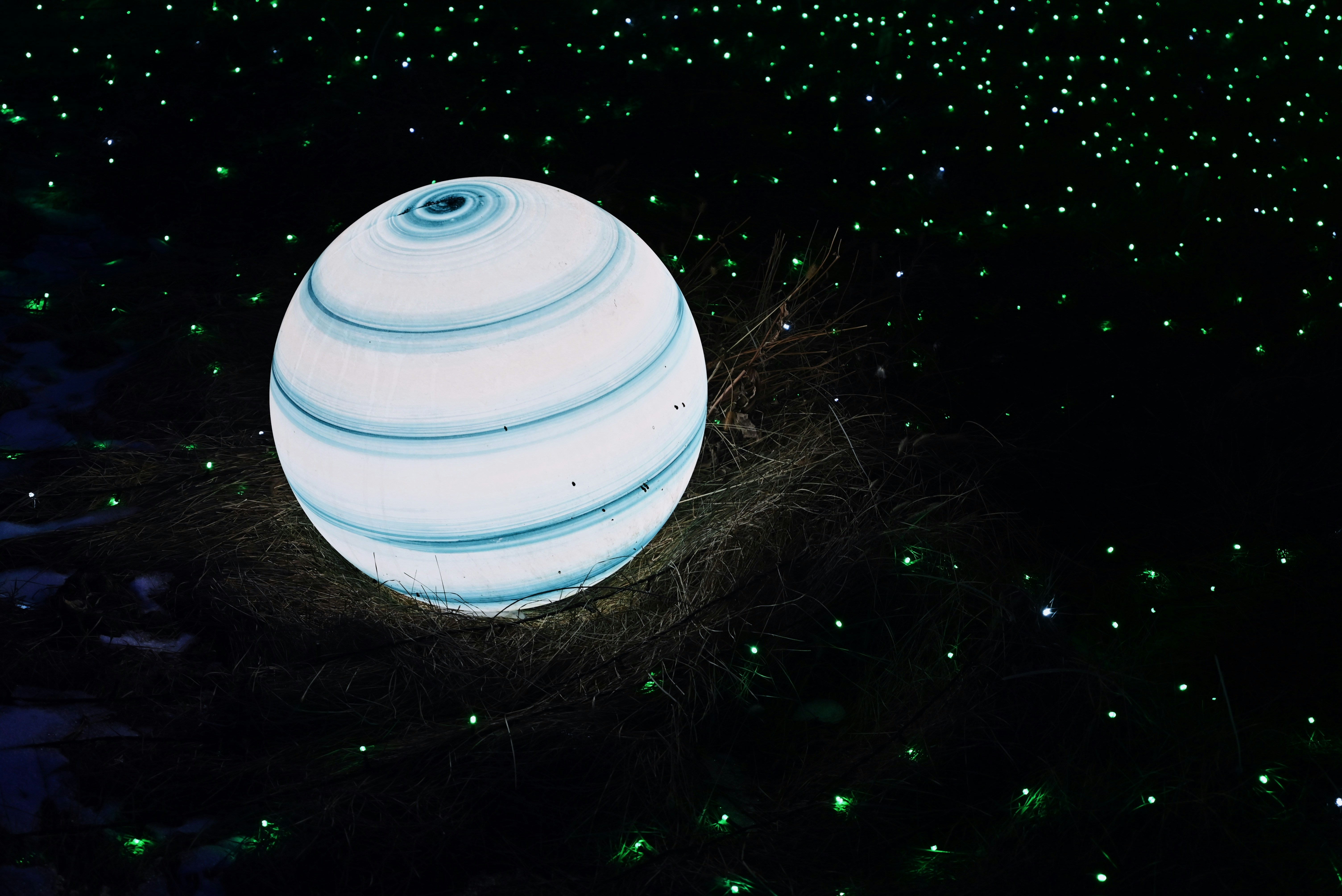 Luminous Orb Cradled in a Glowing Nest