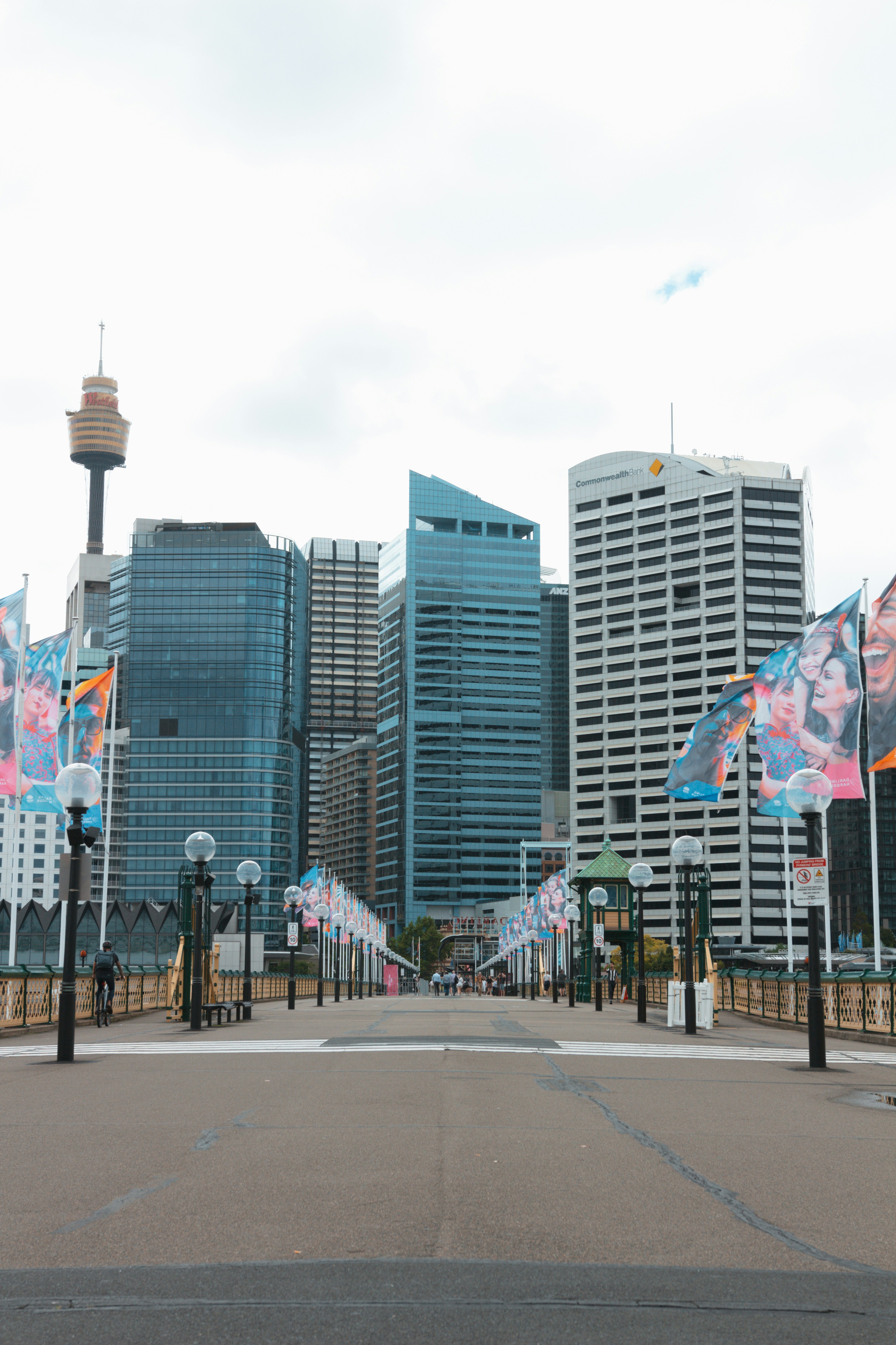 Urban Promenade Toward the Skyline: Flags, Lights and Glass